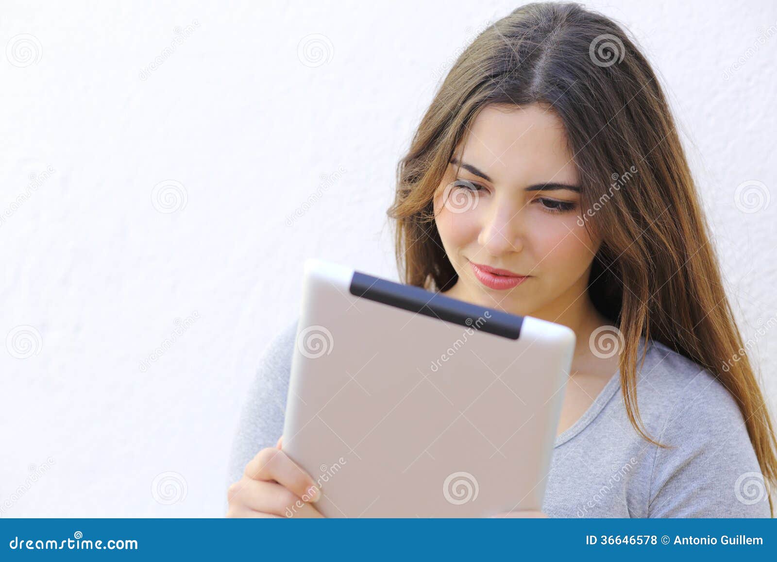 Portrait of a Woman Reading a Tablet Ebook Stock Photo - Image of ...