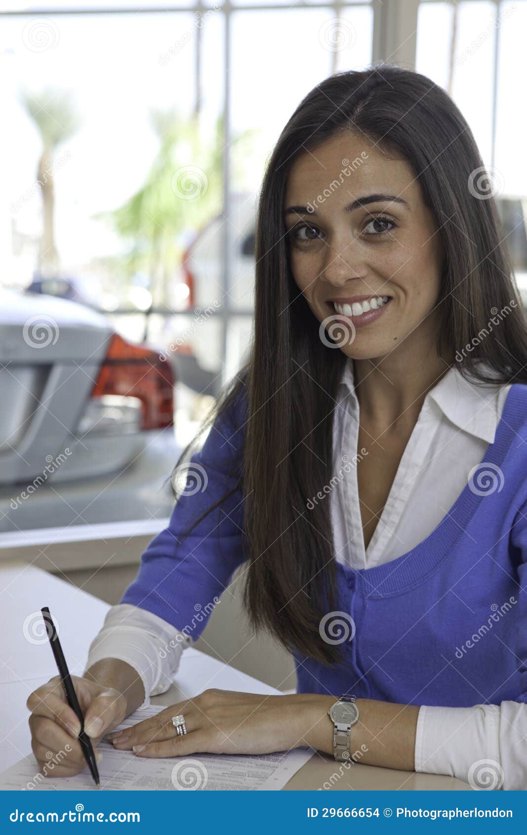 Portrait of Woman Signing Papers Stock Photo - Image of smiling, show ...