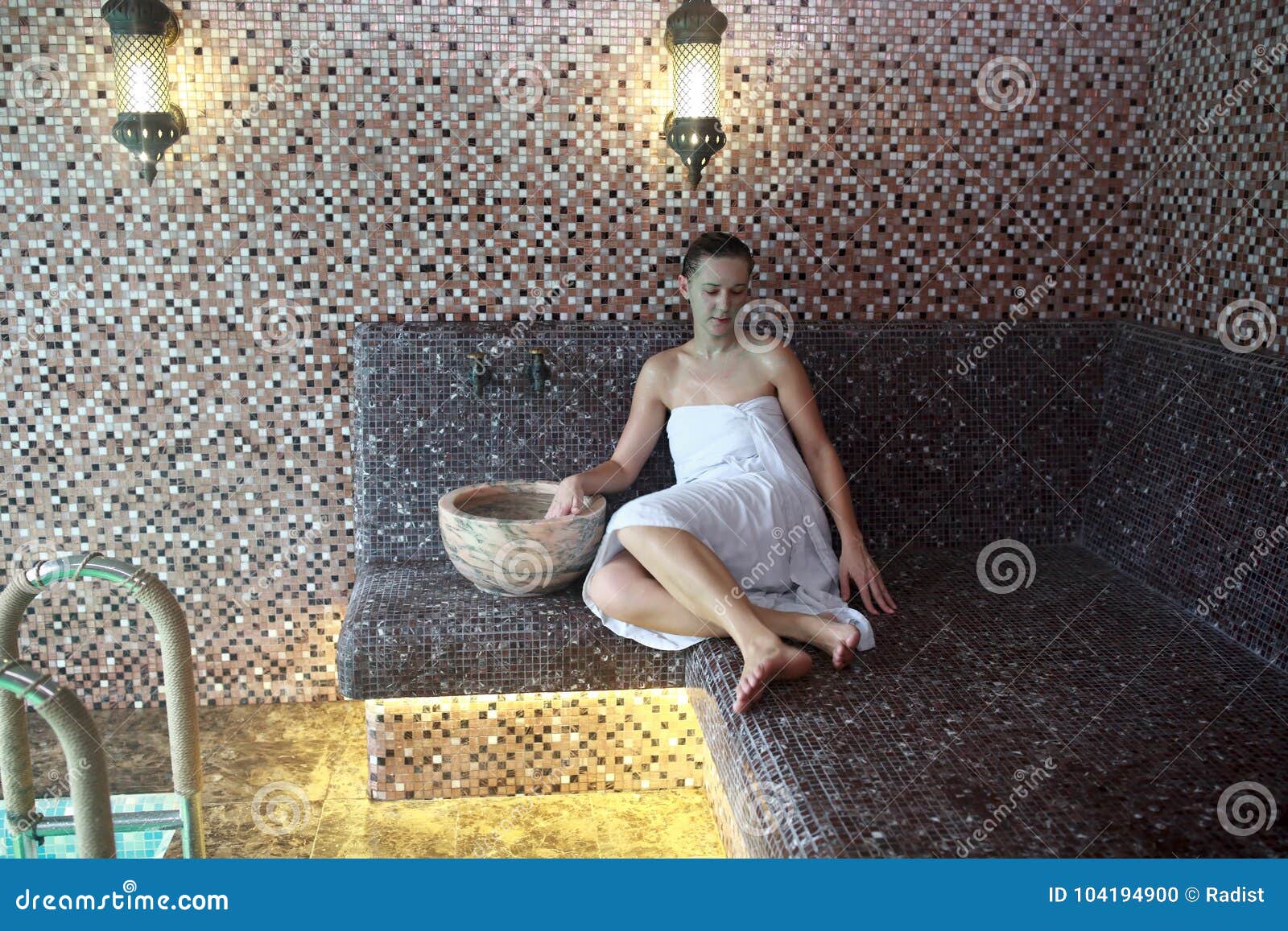 Woman sitting in hammam stock photo. Image of hamam - 104194900
