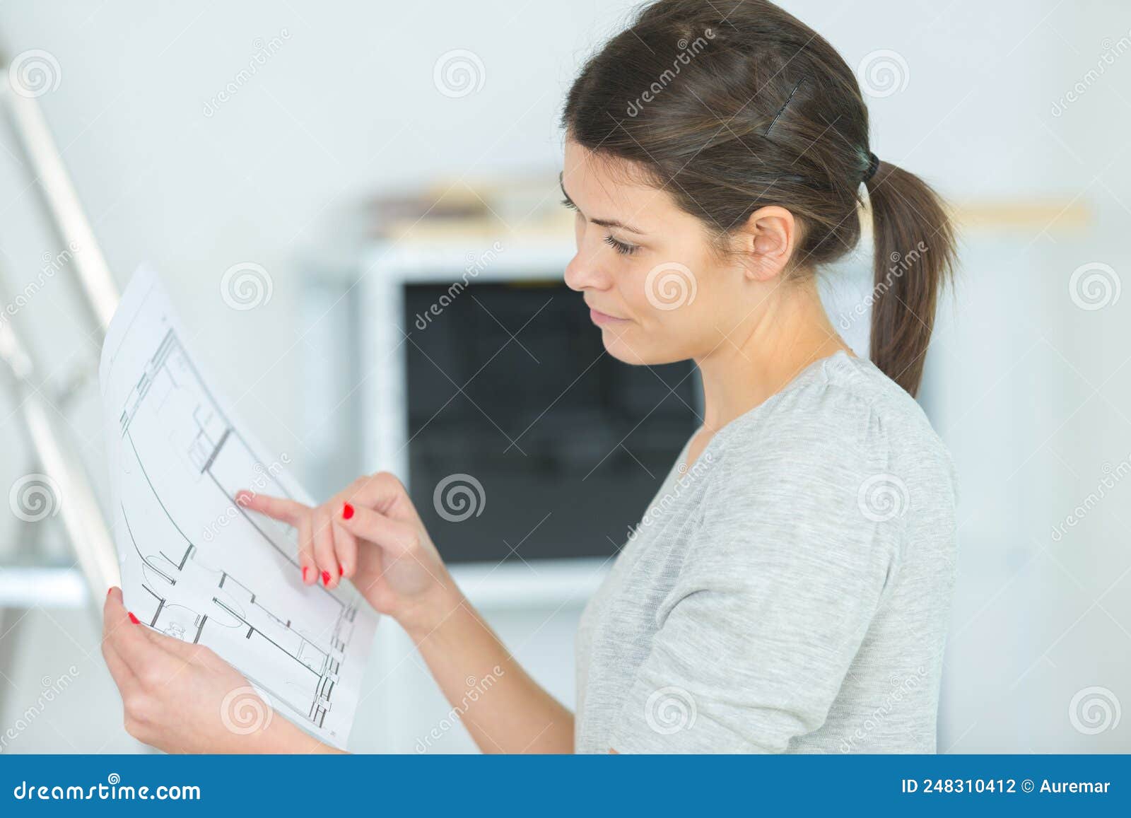 Portrait Woman Studying Blueprint Stock Photo - Image of reading ...