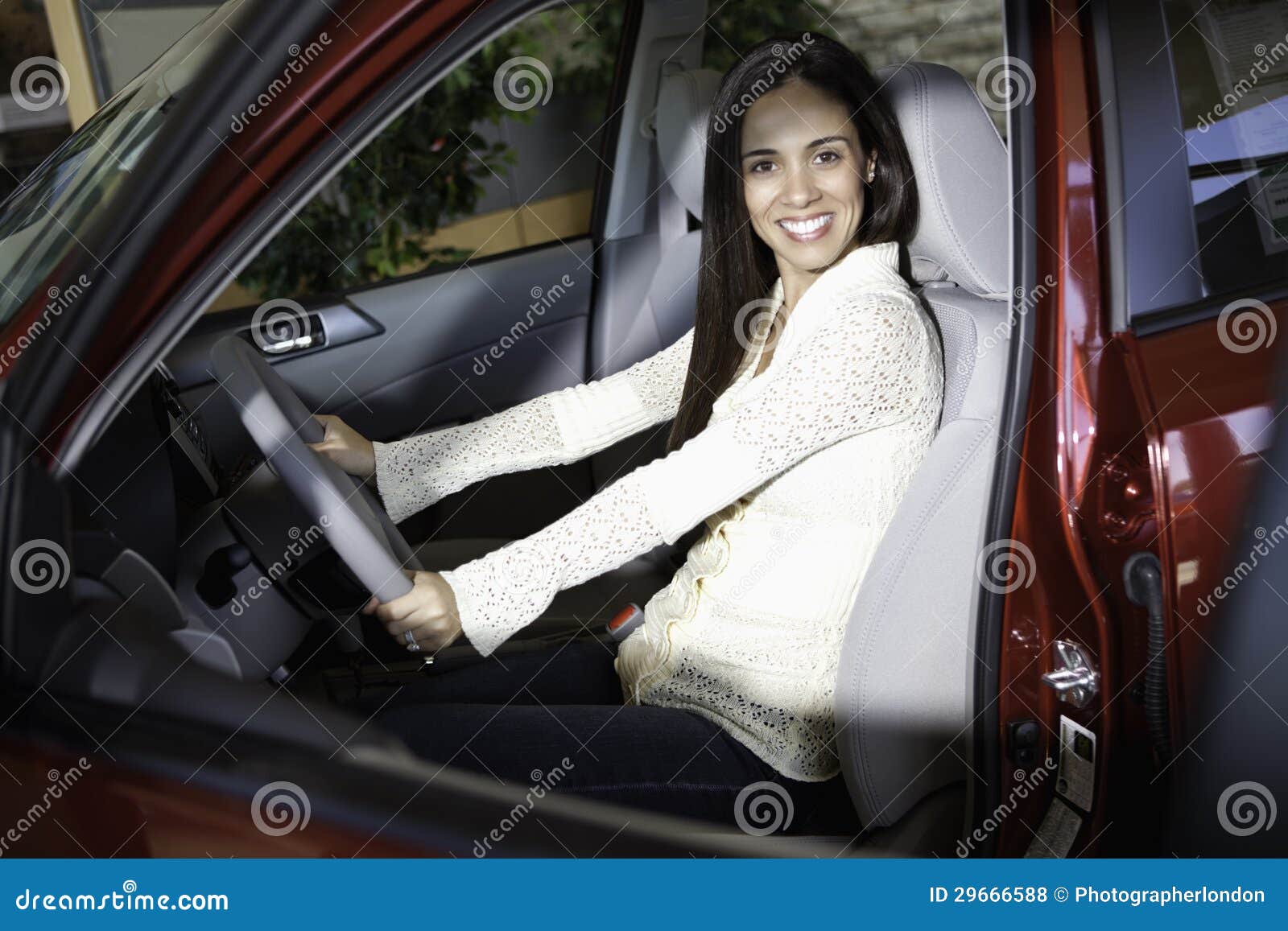 Portrait of a Woman Taking a Test Drive Stock Photo - Image of smiling ...