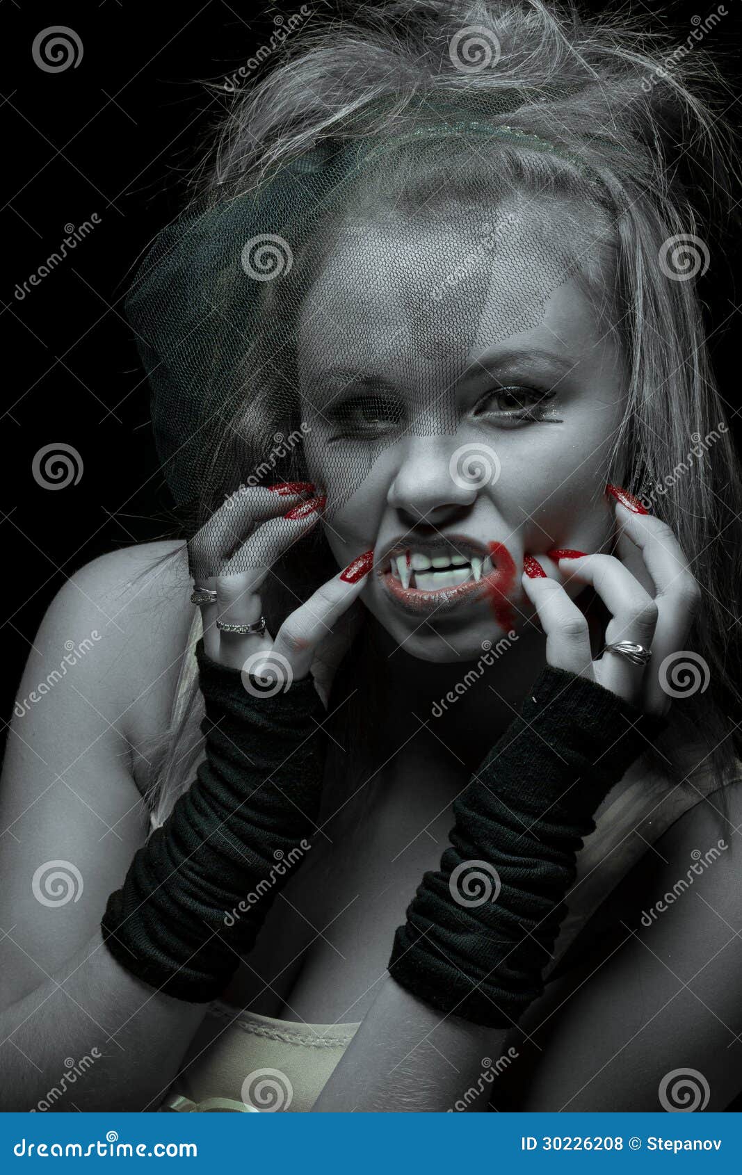 Woman Vampire with Fangs on a Black Background Stock Photo - Image of ...