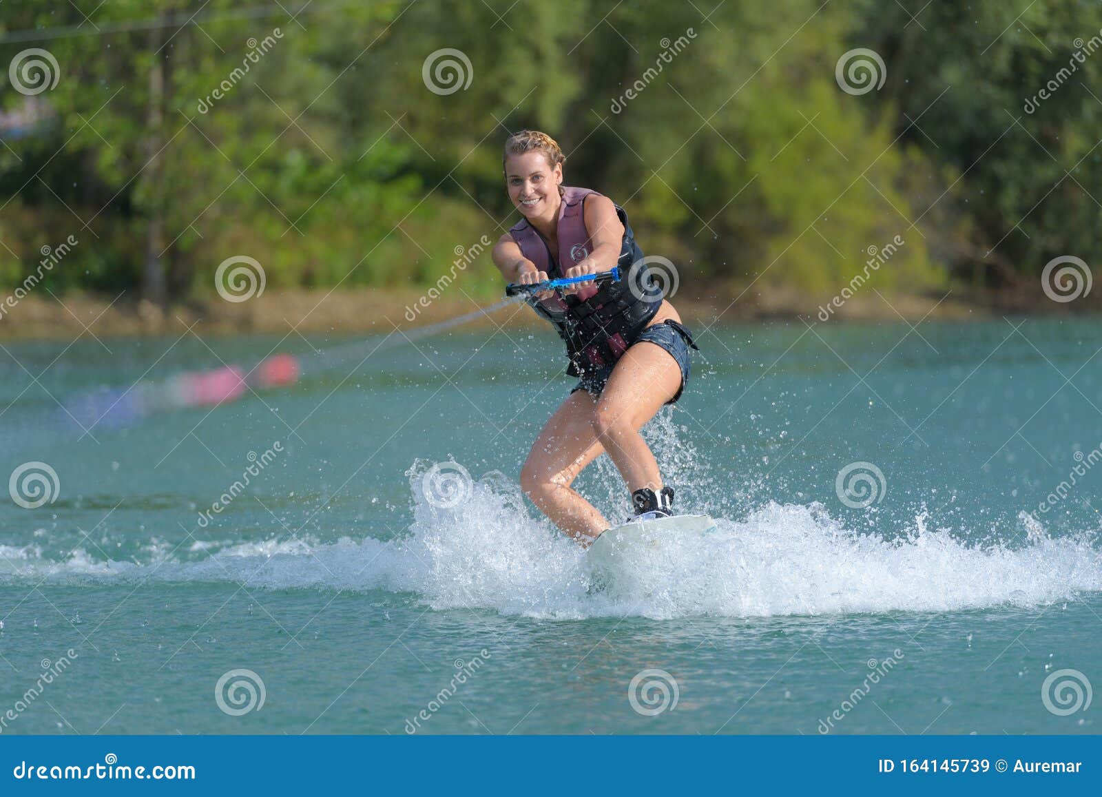 Portrait woman waterskiing stock image. Image of tourist - 164145739