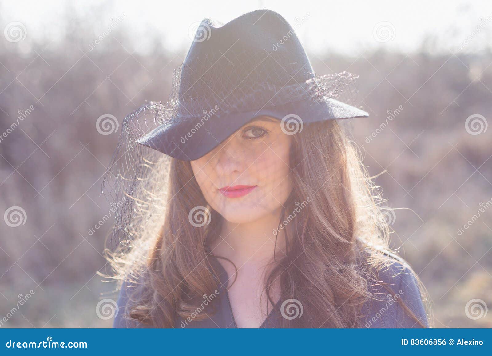 Portrait of a Woman Wearing a Hat Stock Photo - Image of eyes, adult ...