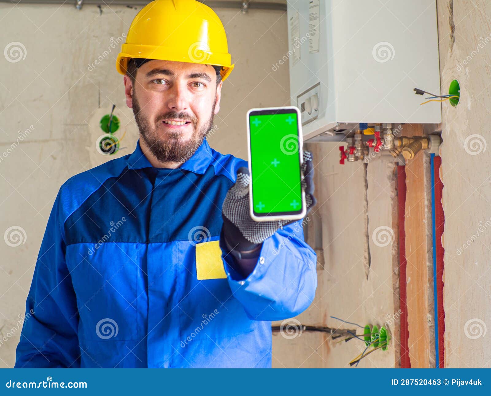 Portrait of Worker or Engineer in Blue Work Clothes and Yellow Safety ...