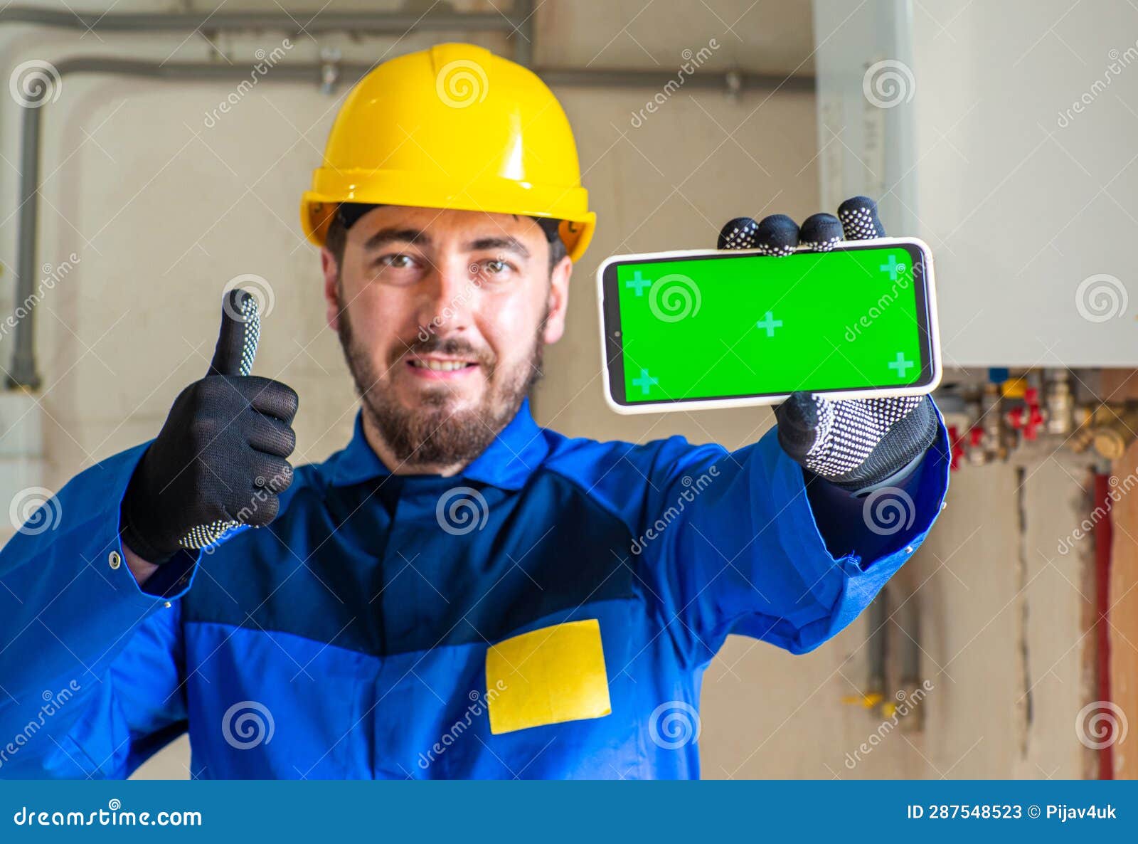 Portrait of Worker or Engineer in Blue Work Clothes and Yellow Safety ...