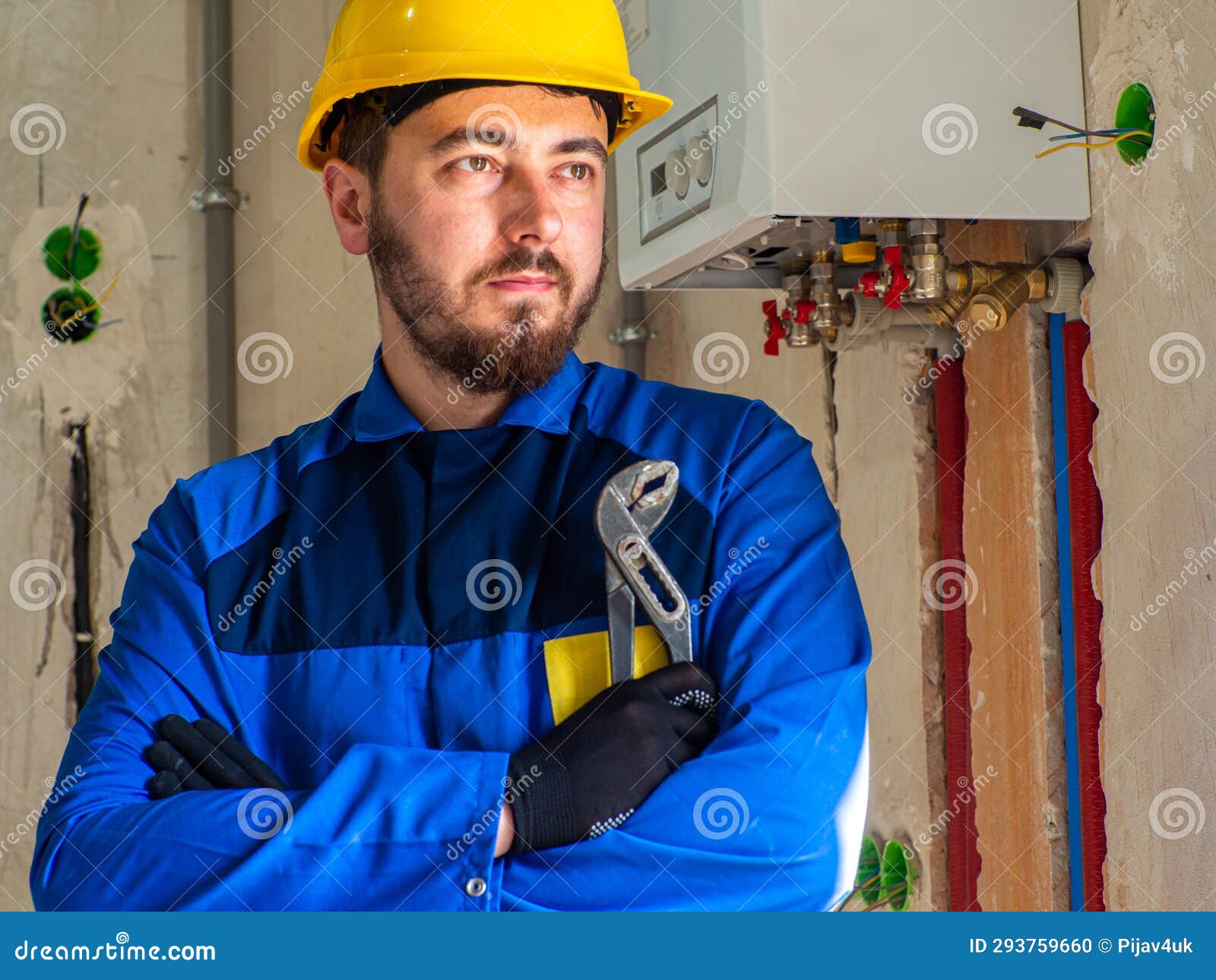 Portrait of Worker or Engineer in Blue Work Clothes and Yellow Safety ...