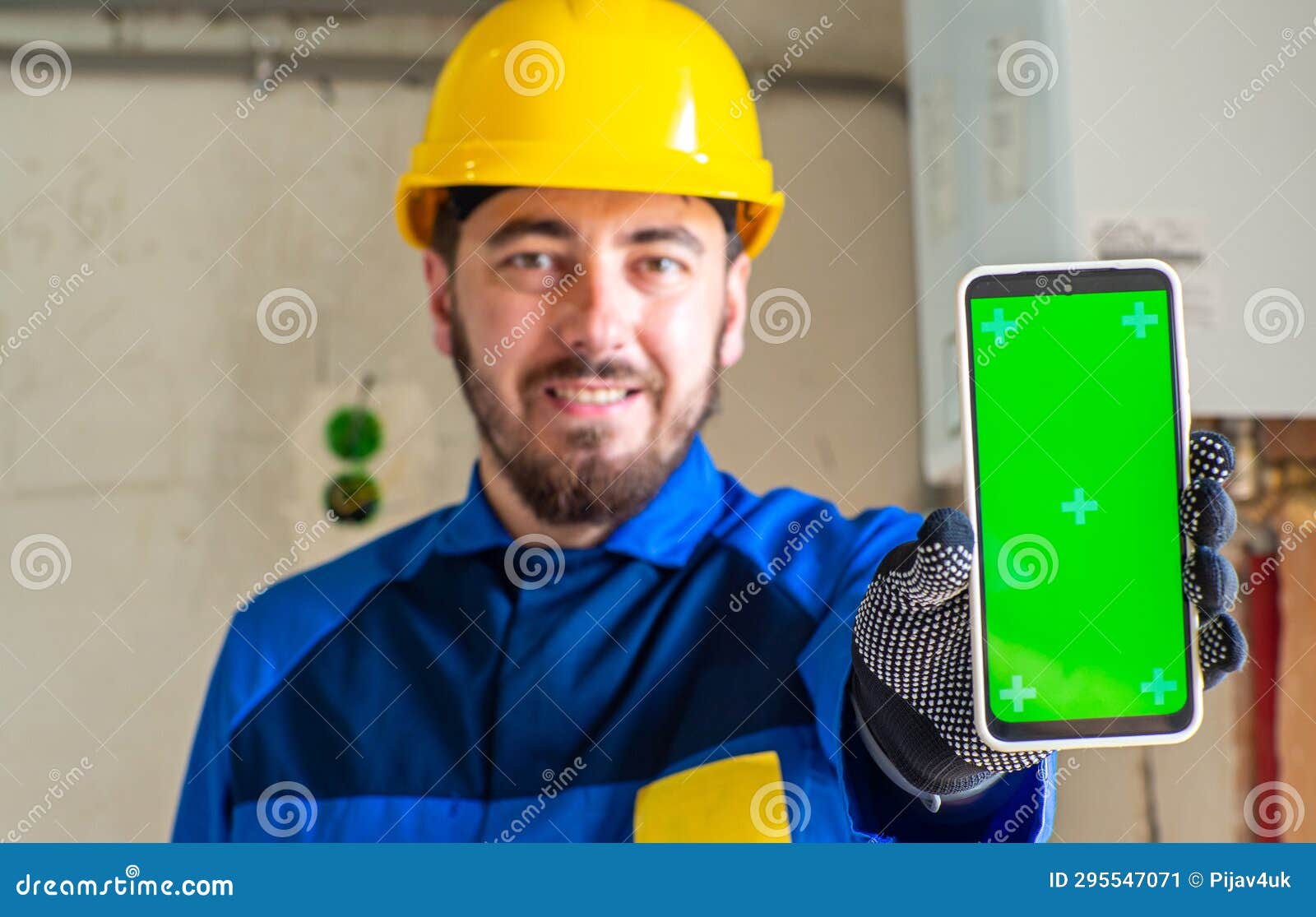 Portrait of Worker or Engineer in Blue Work Clothes and Yellow Safety ...