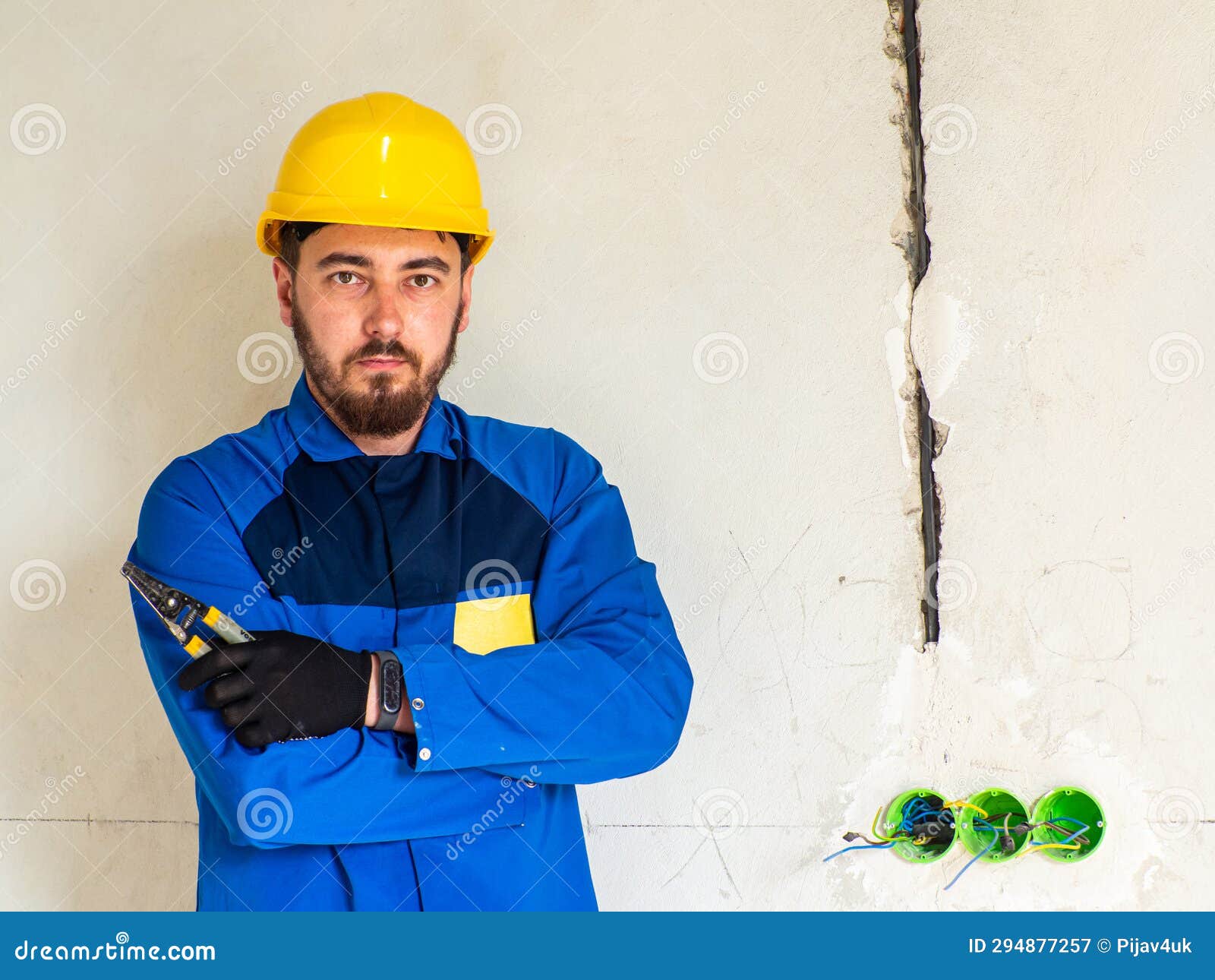 Portrait of Worker or Engineer in Blue Work Clothes and Yellow Safety ...