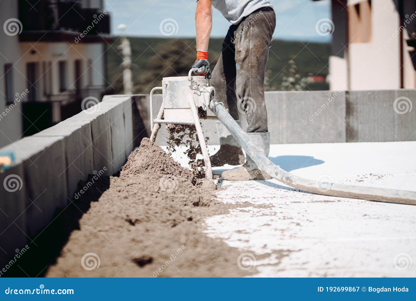 Portrait Of Worker Using Sand And Cement Pump, Screed Laying And ...