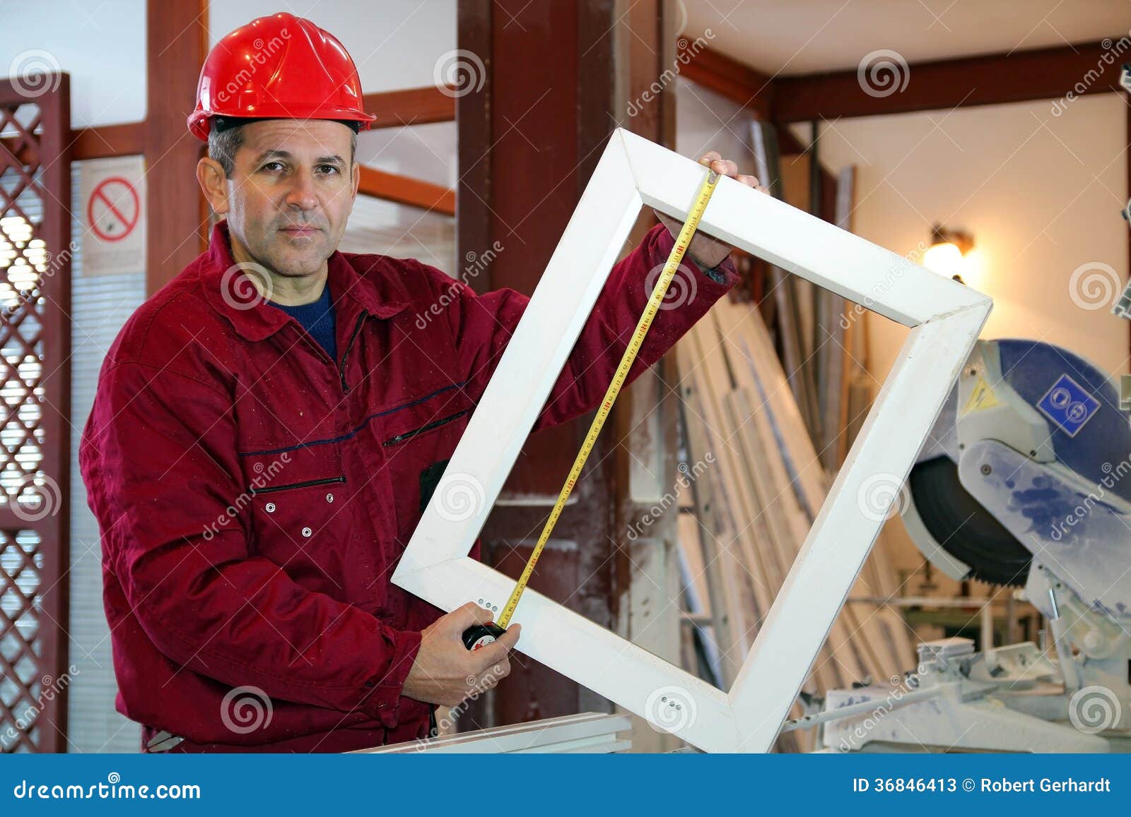 Portrait of a Worker Using a Tape Measure Stock Image - Image of ...