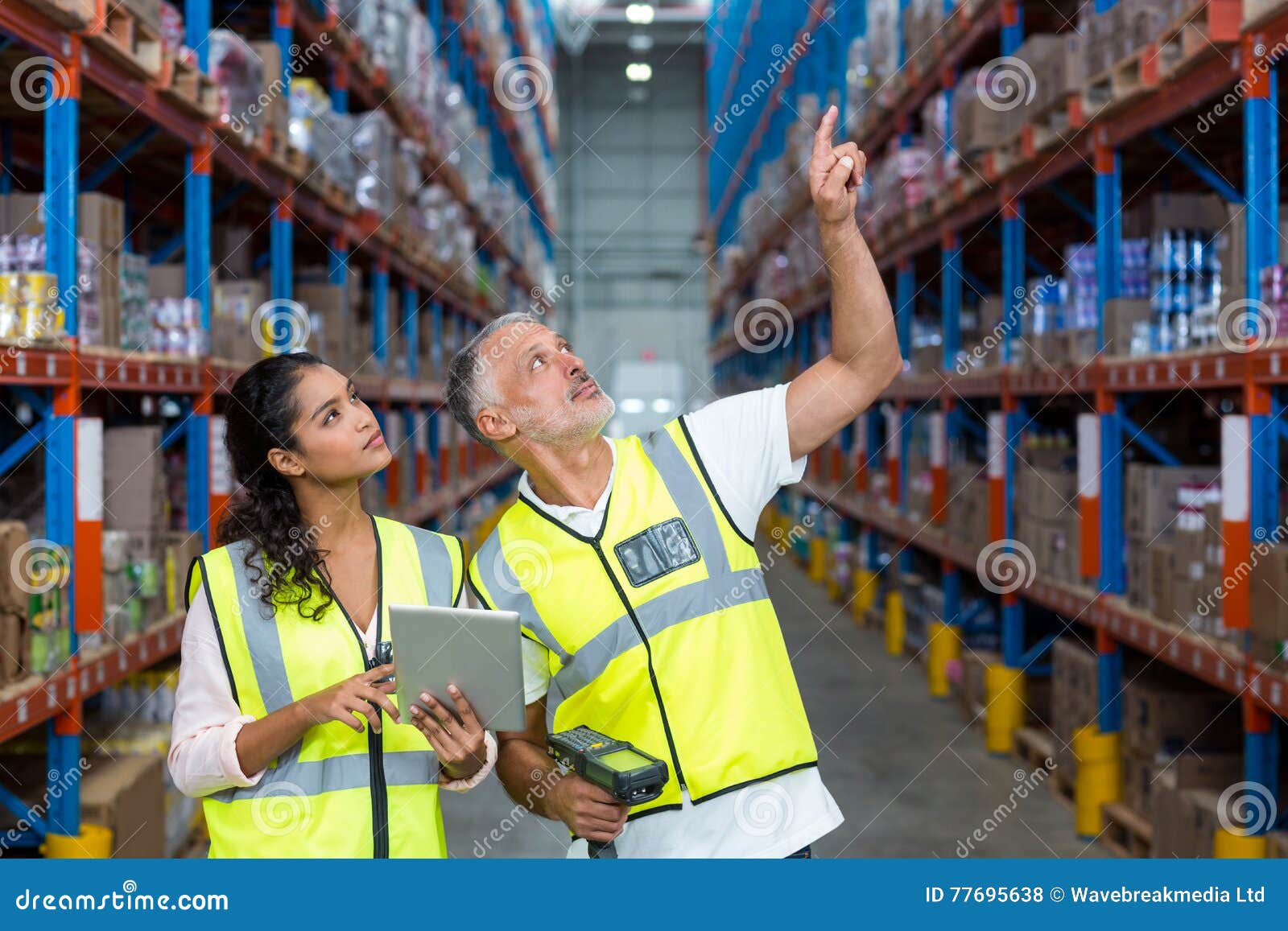 Portrait of Workers are Looking Up and Pointing Shelves Stock Photo ...