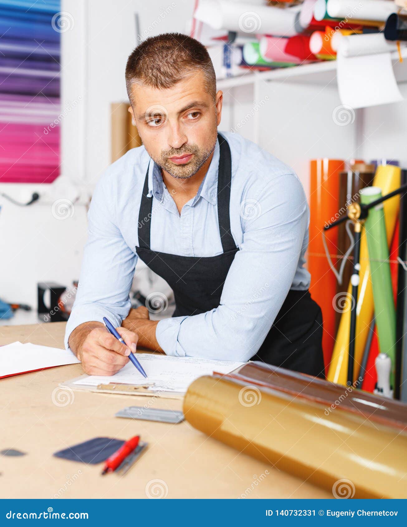 Portrait of a Working Man at Printer Studio Stock Image - Image of foil ...