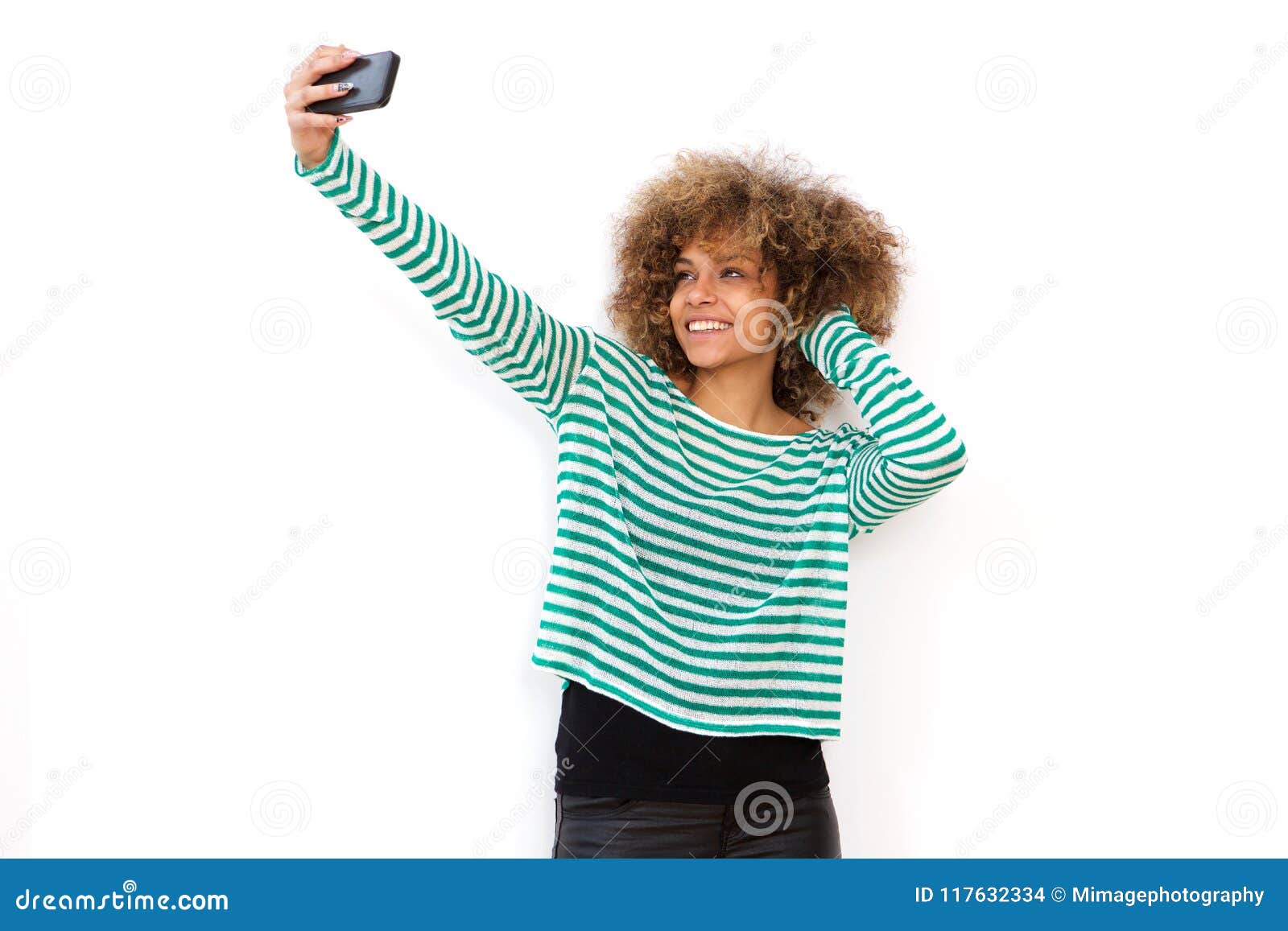 Young African American Woman Taking Selfie With Mobile Phone Stock