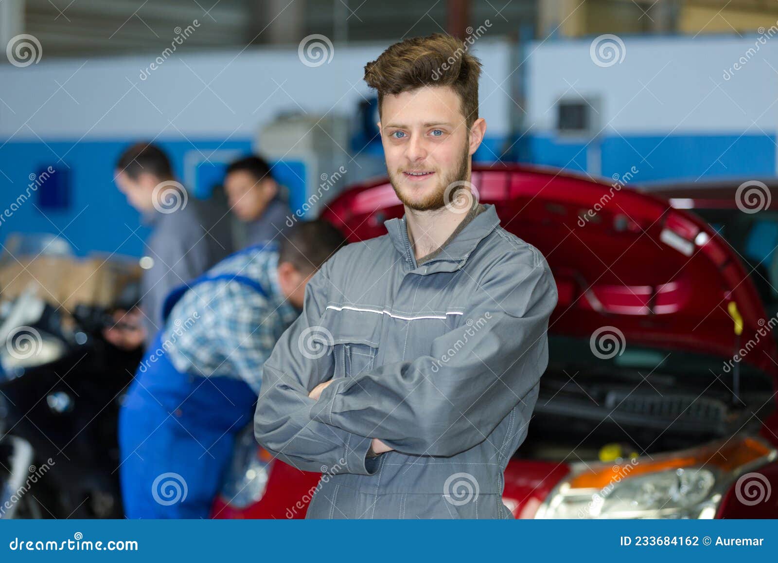 Portrait Young Apprentice Mechanic in Car Garage Stock Photo - Image of ...