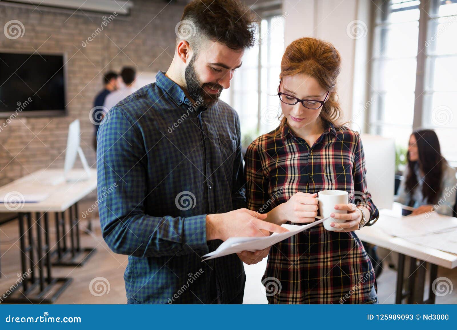 Portrait of Young Architects Discussing in Office Stock Image - Image ...