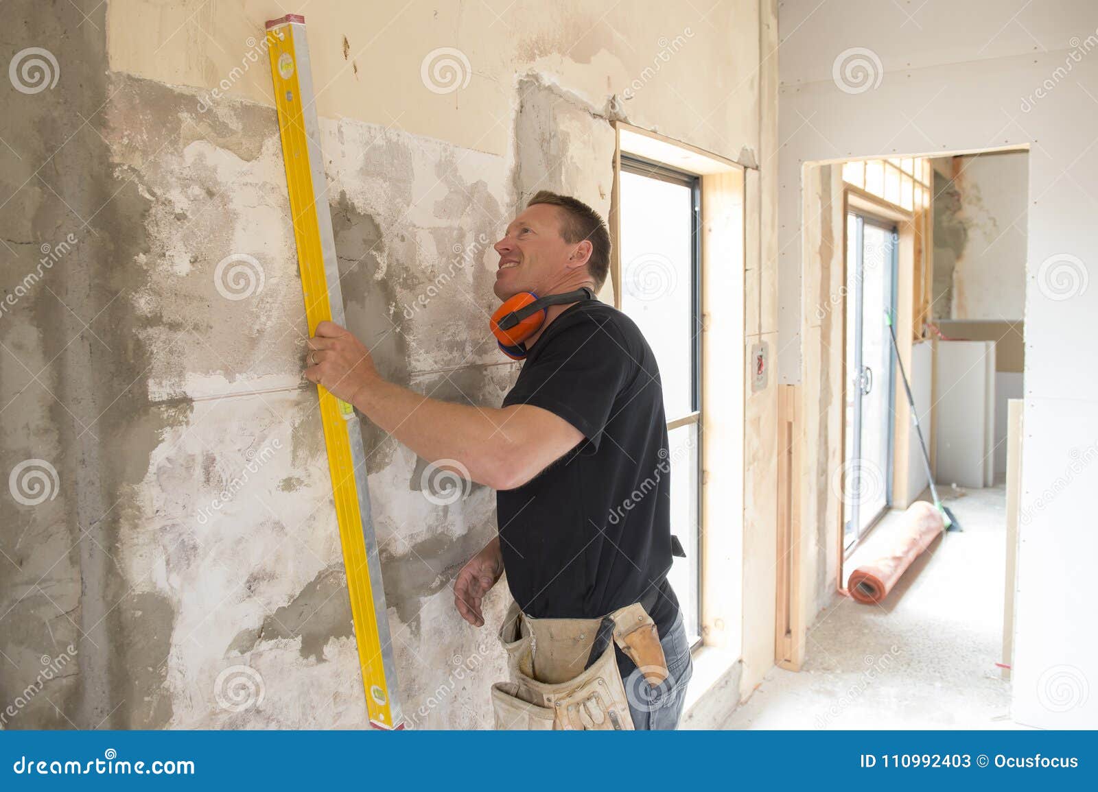 Portrait of Young Attractive Builder Man Working Confident Measuring ...