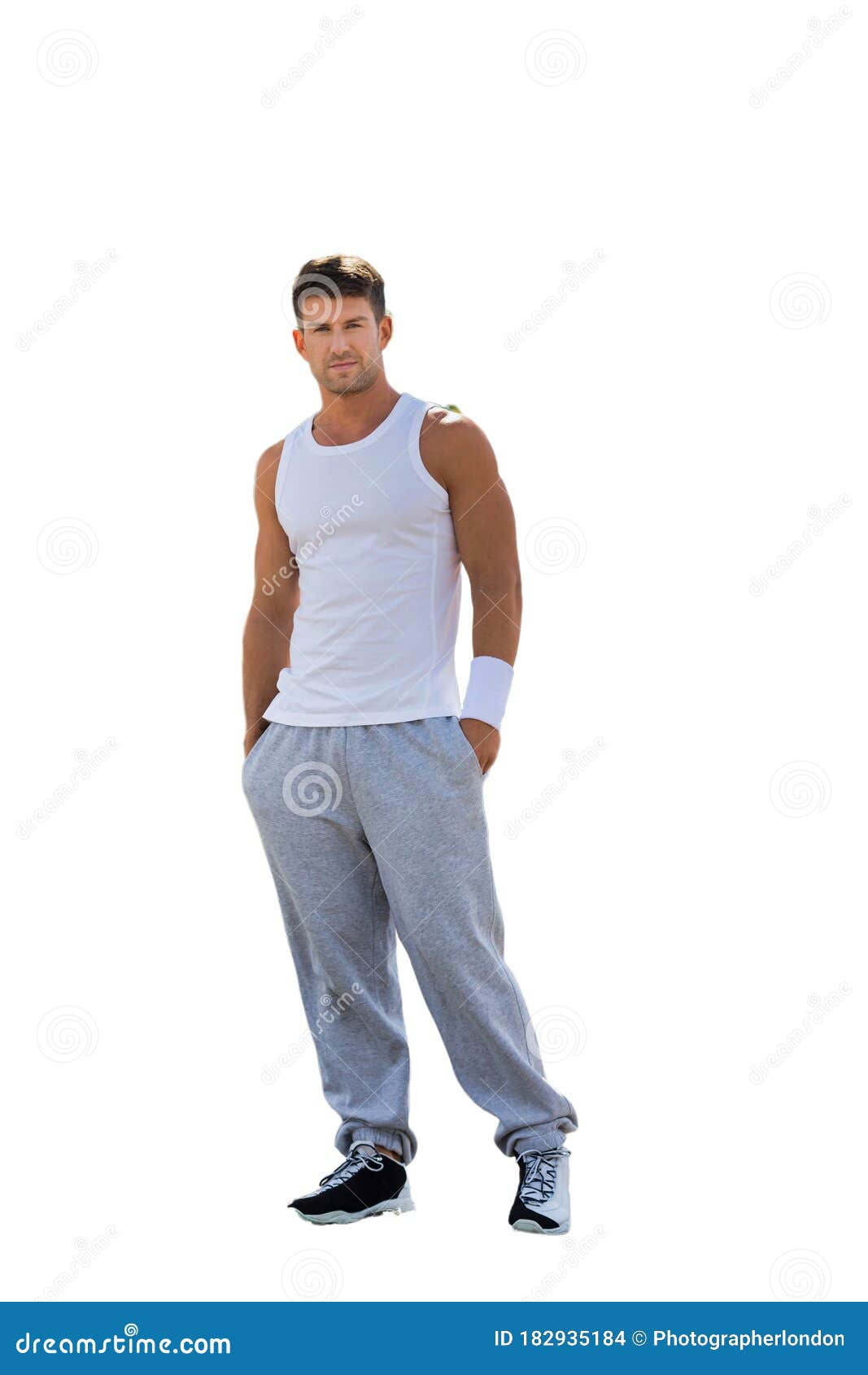 Portrait of Young Attractive Man Wearing Sports Wear Standing in Park ... Portrait of Young Attractive Man Wearing Sports Wear Standing in Park ...