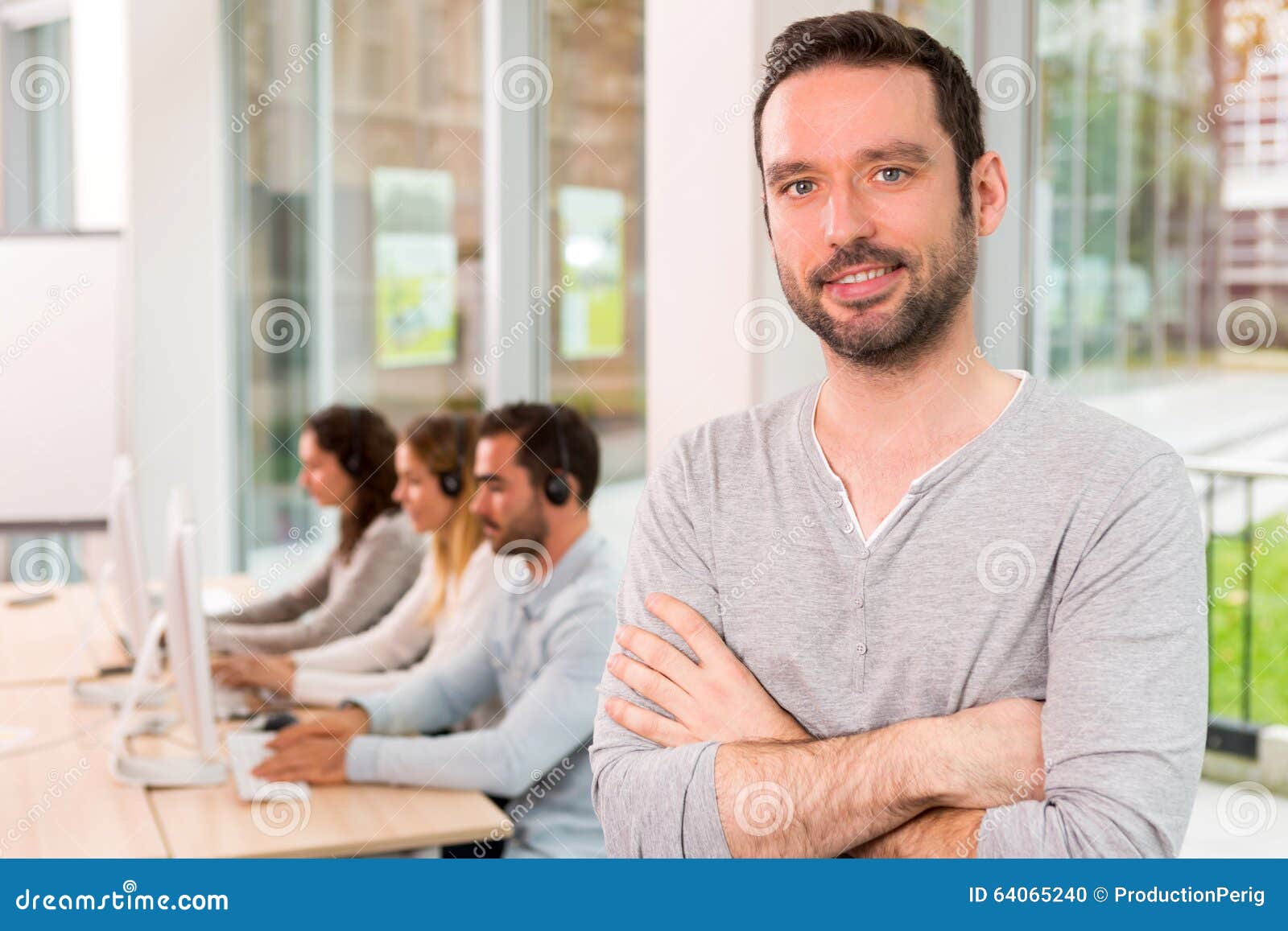 Portrait of a Young Attractive Man at Work Stock Photo - Image of team ...