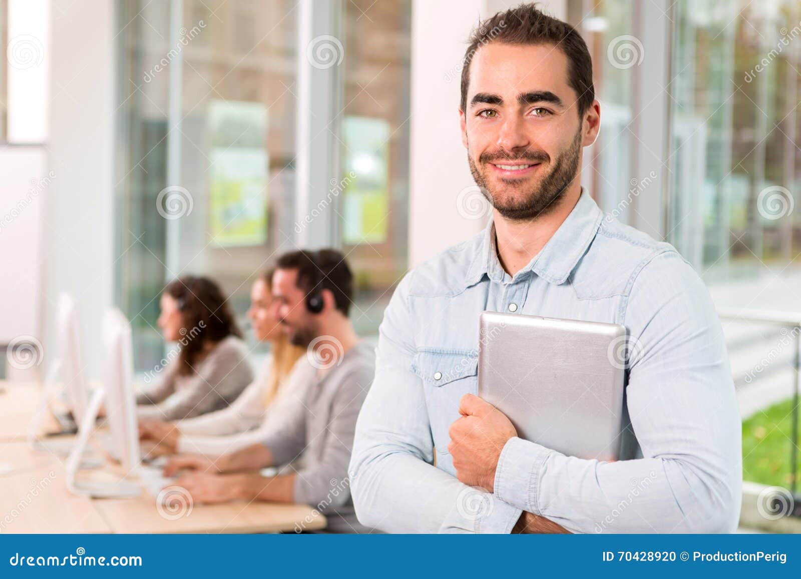 Portrait of a Young Attractive Man at Work Stock Photo - Image of ...