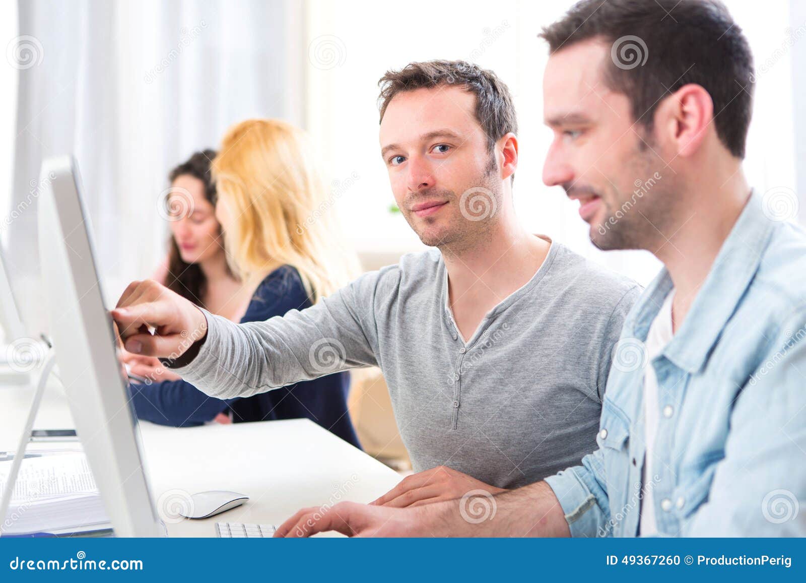 Portrait of a Young Attractive Men Working at the Office Stock Photo ...