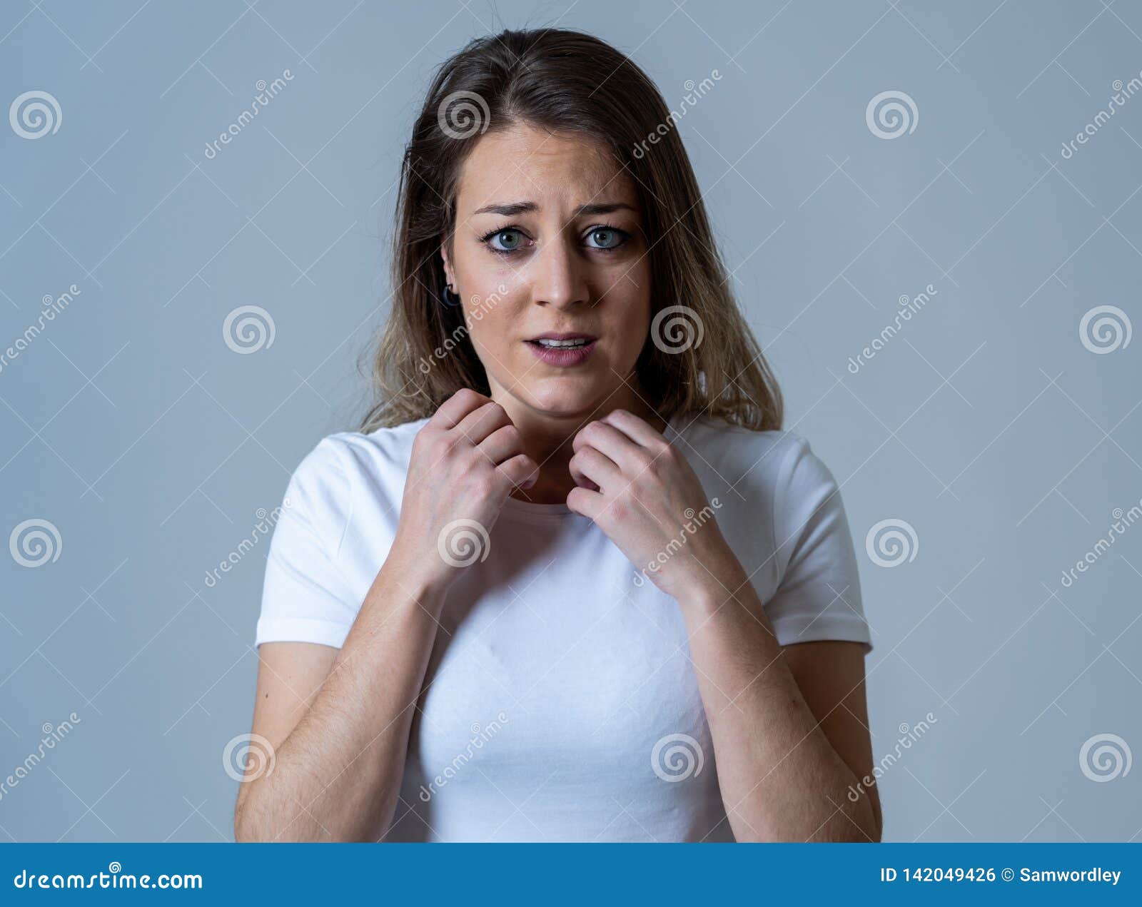 Portrait Of A Young Attractive Woman Looking Scared And Shocked Human