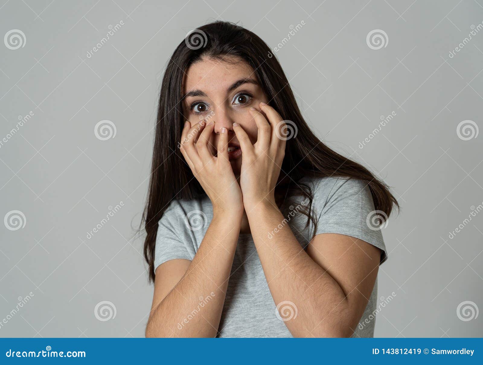 Portrait Of A Young Attractive Woman Looking Scared And Shocked Human