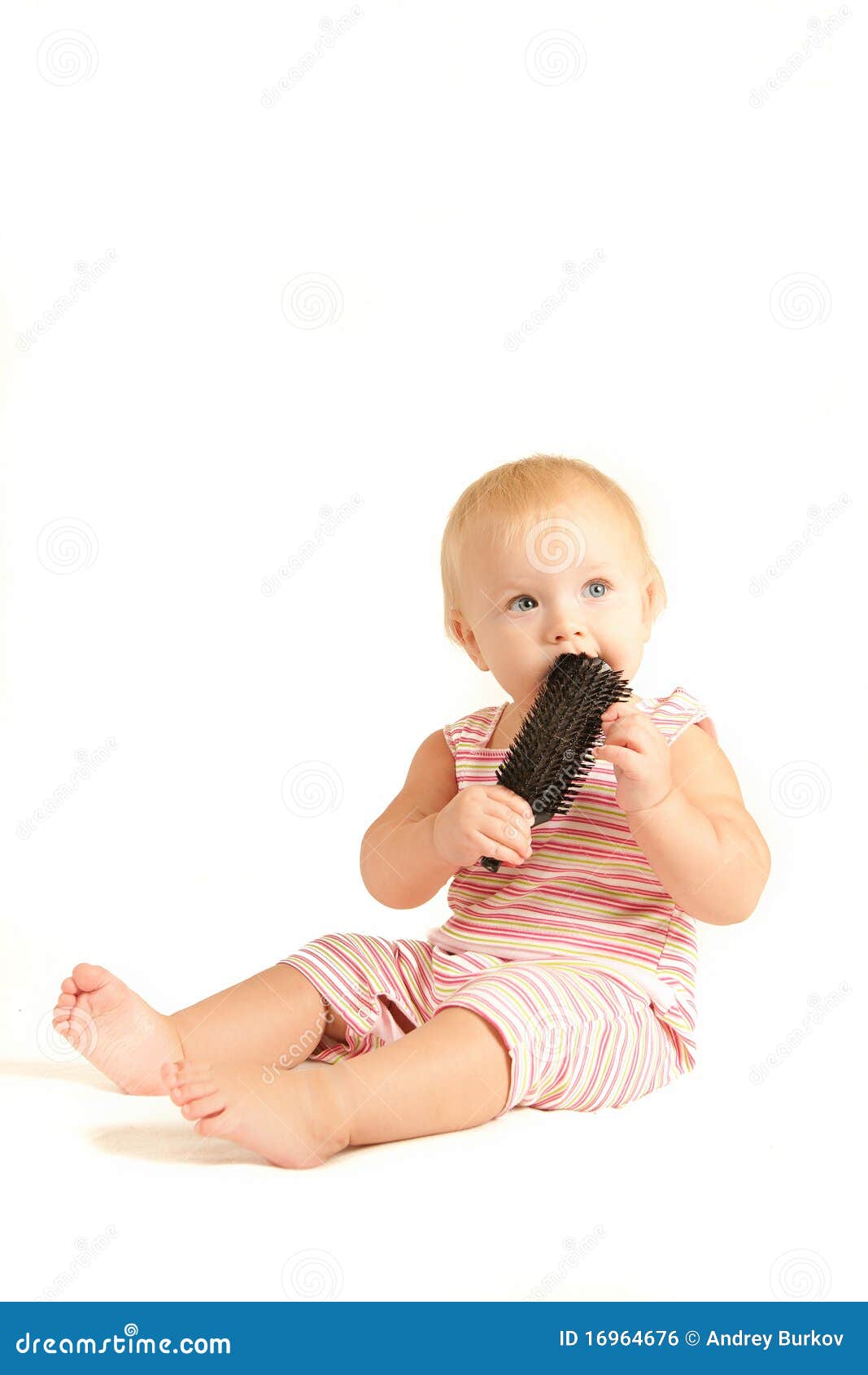 Portrait of Young Baby Playing with Comb Stock Photo - Image of lovely ...