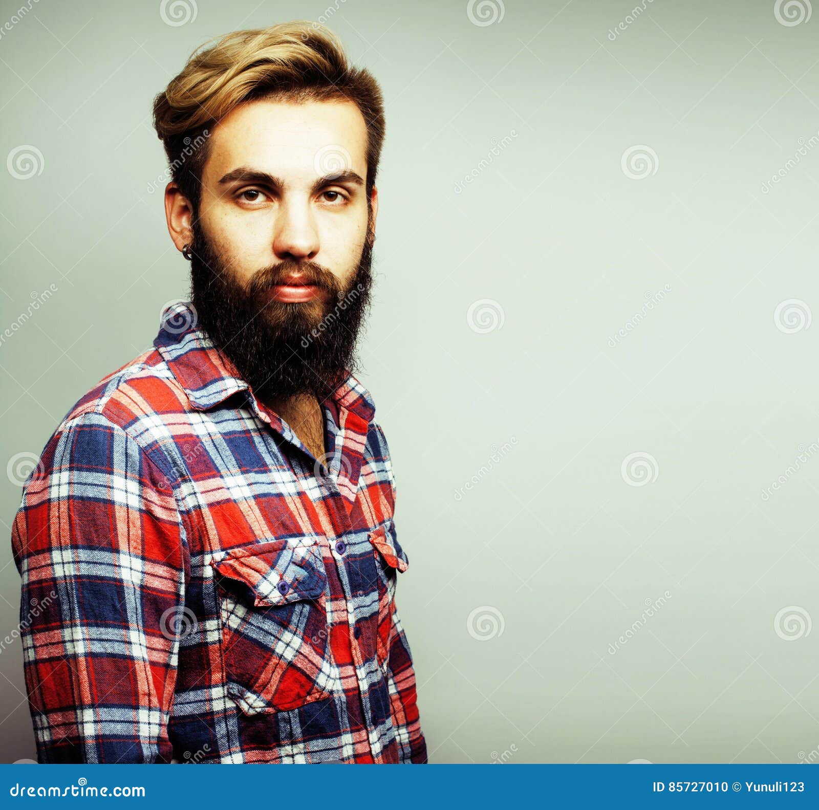 Portrait Of Young Bearded Hipster Guy Smiling On White Backgroun Stock