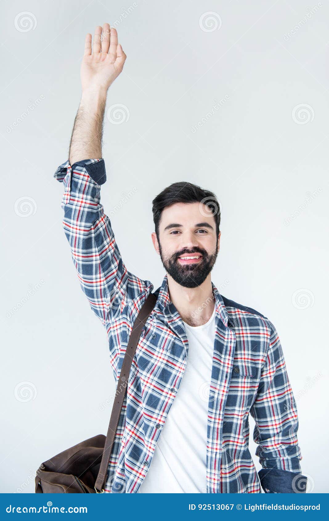 Portrait of Young Bearded Man with Raising Hand in Studio Stock Image ...