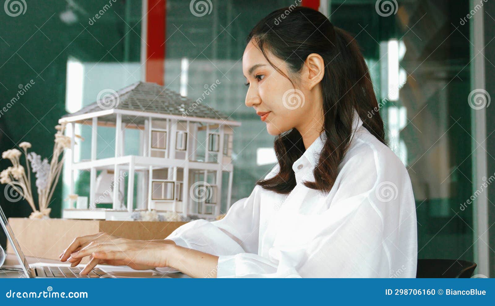 Young Beautiful Engineer Checking Roof Material and Using Laptop ...