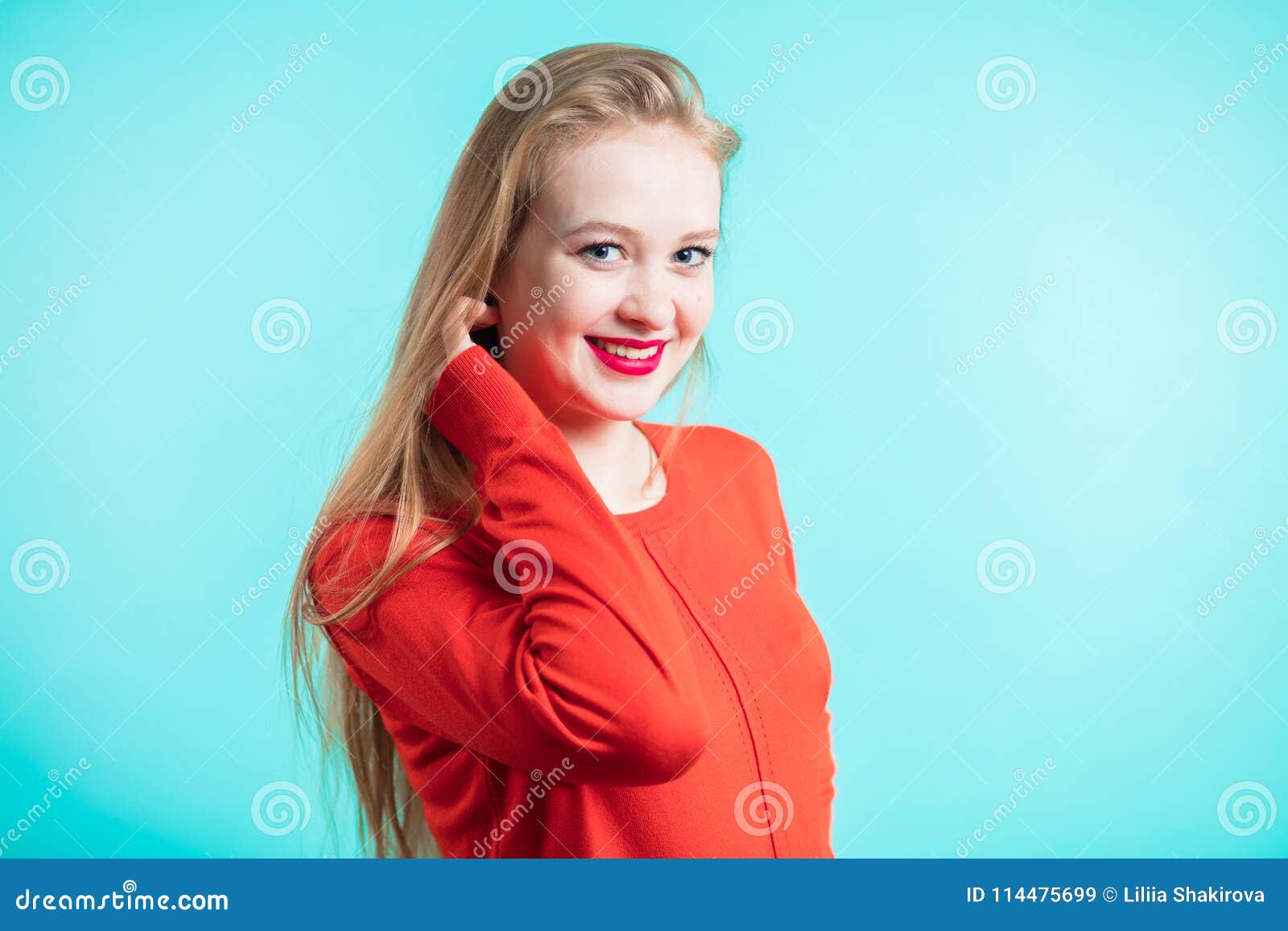 Portrait Of Young Beautiful Cute Cheerful Girl Smiling Looking At