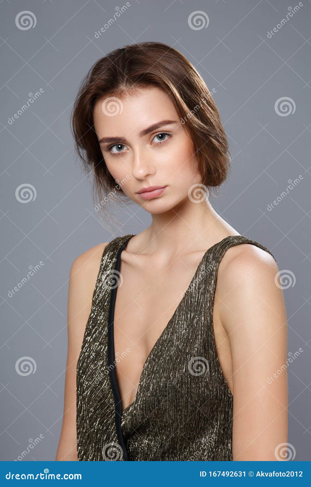 Portrait of Young Beautiful Girl. Perfect Skin. Dress with Deep V-neck ... Portrait of Young Beautiful Girl. Perfect Skin. Dress with Deep V-neck ...