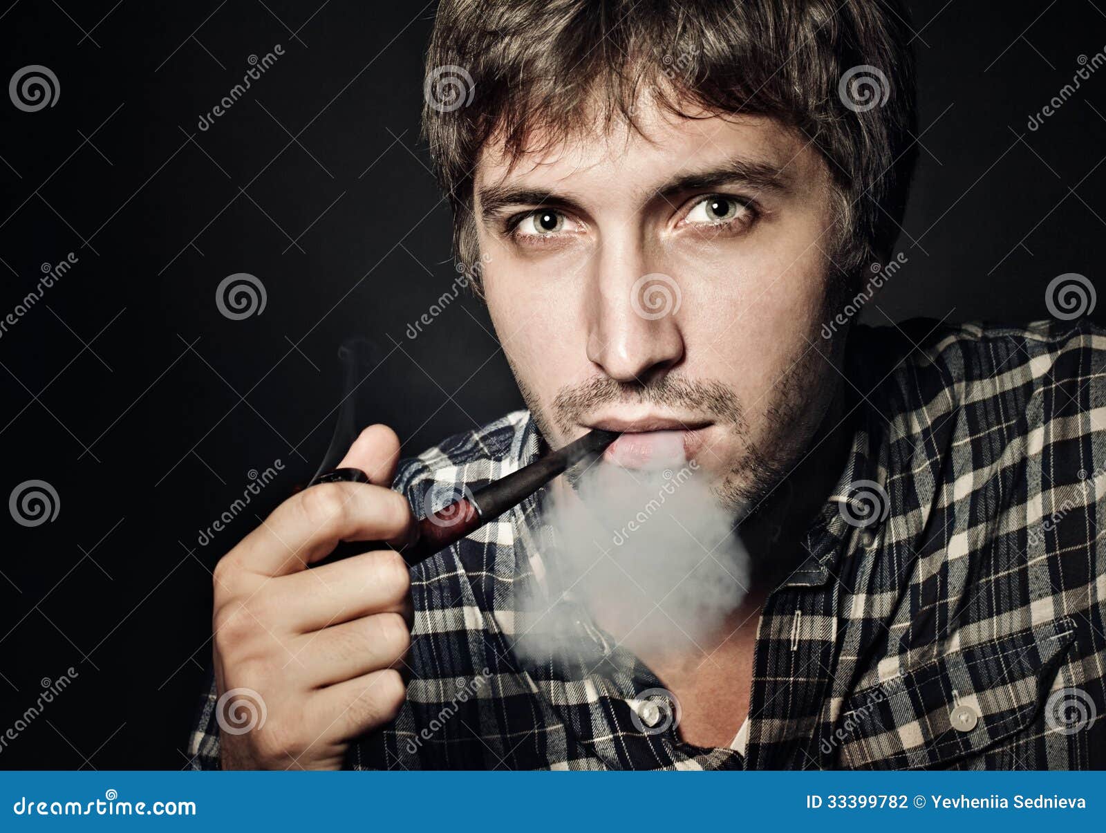 Portrait of the Young Beautiful Man Smoking a Pipe Stock Photo - Image ...