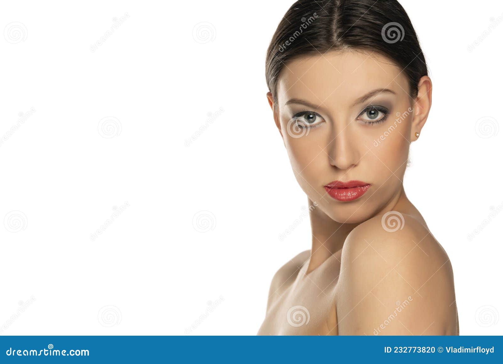 Portrait Of A Young Beautiful Shirtless Woman With Blue Eyes And Makeup