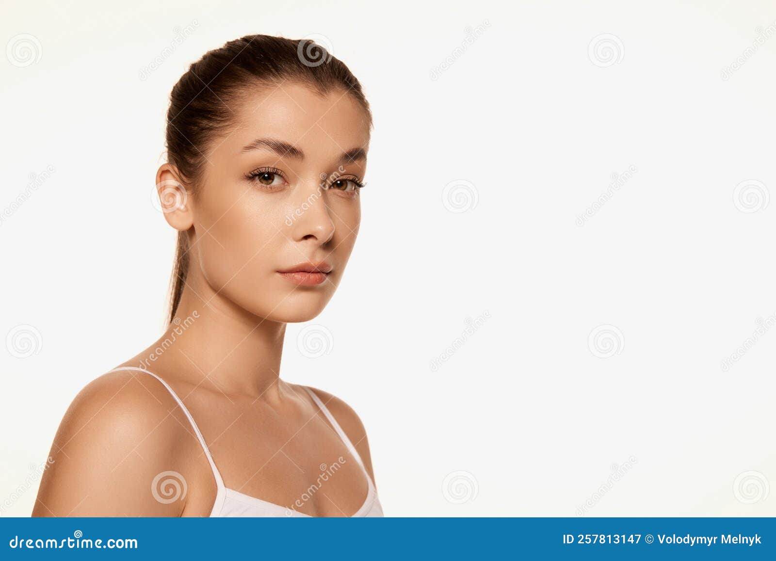 Portrait Of Young Beautiful Woman With Clear Spotless Skin Isolated