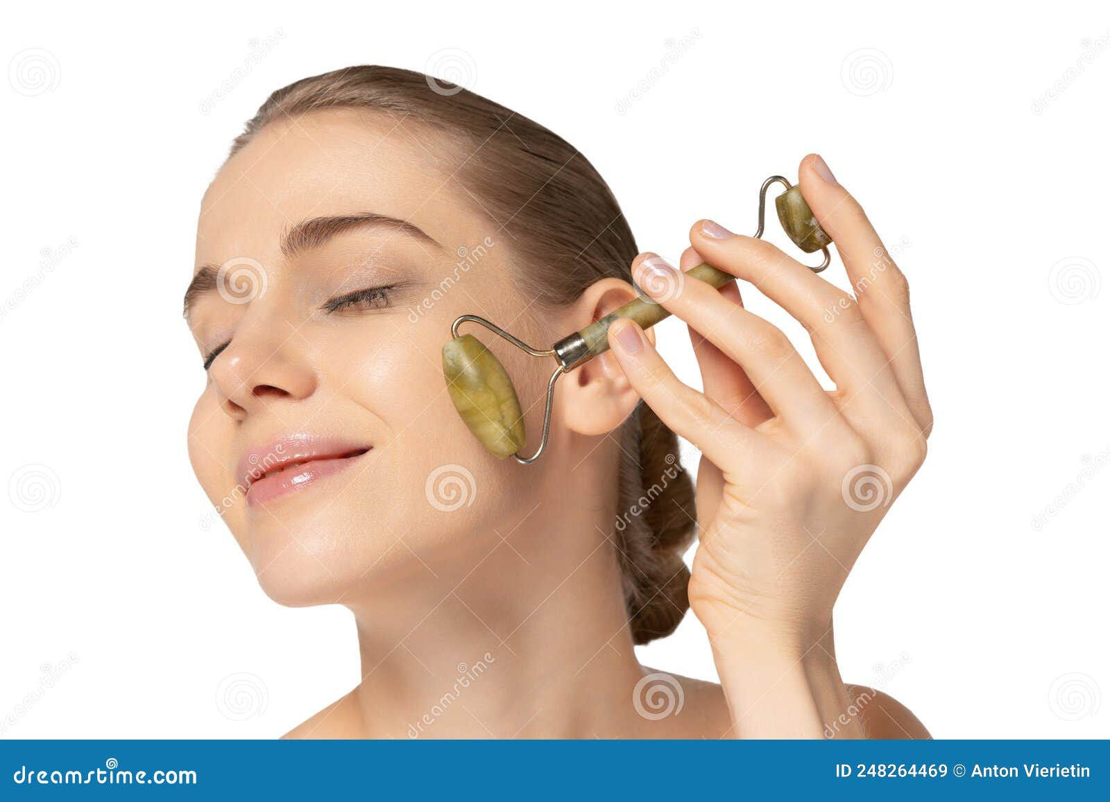 Portrait Of Young Beautiful Woman Taking Care After Skin Doing Massage