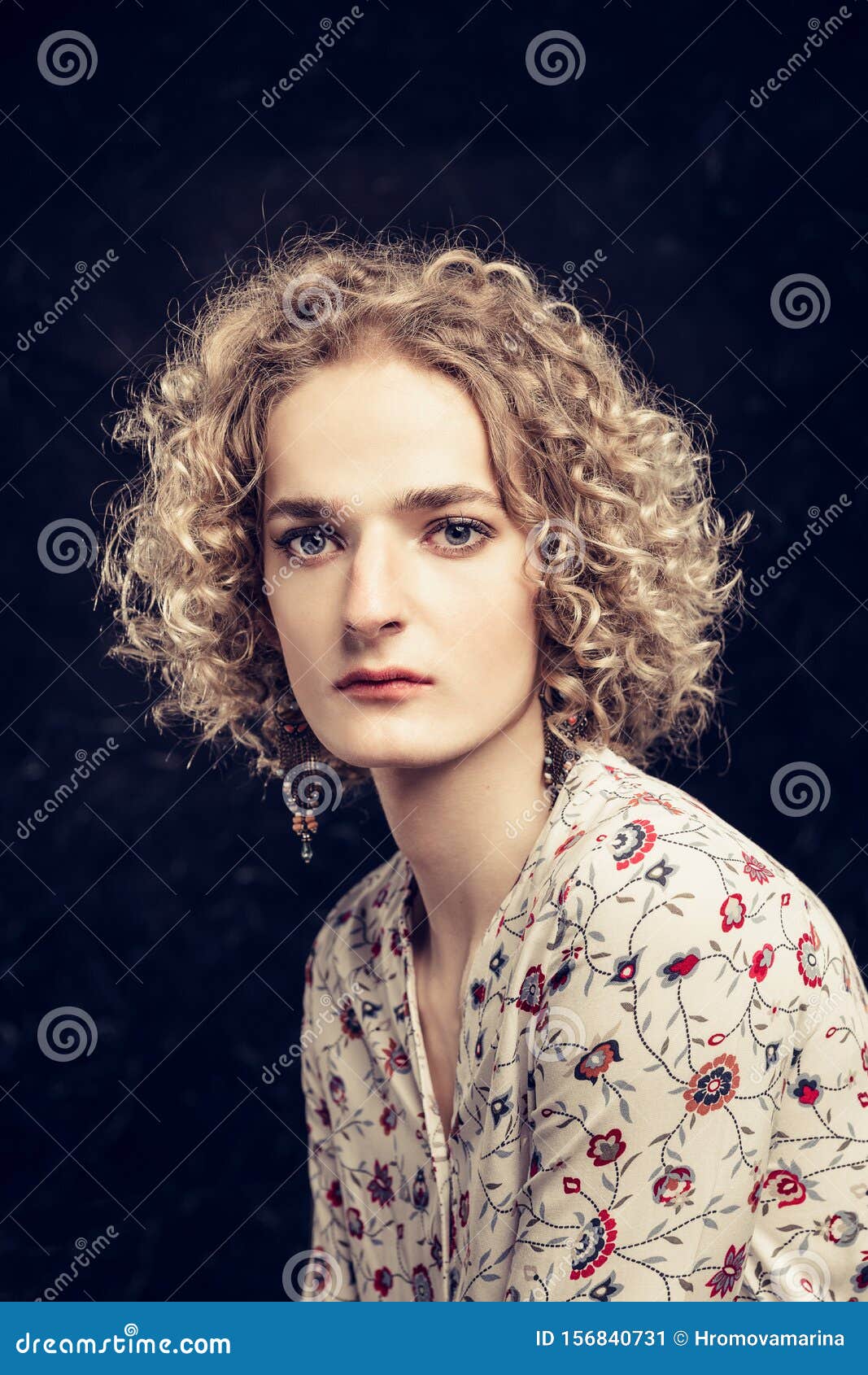 A Portrait Blond Man Androgyn in the Image of an Attractive Woman Stock ...