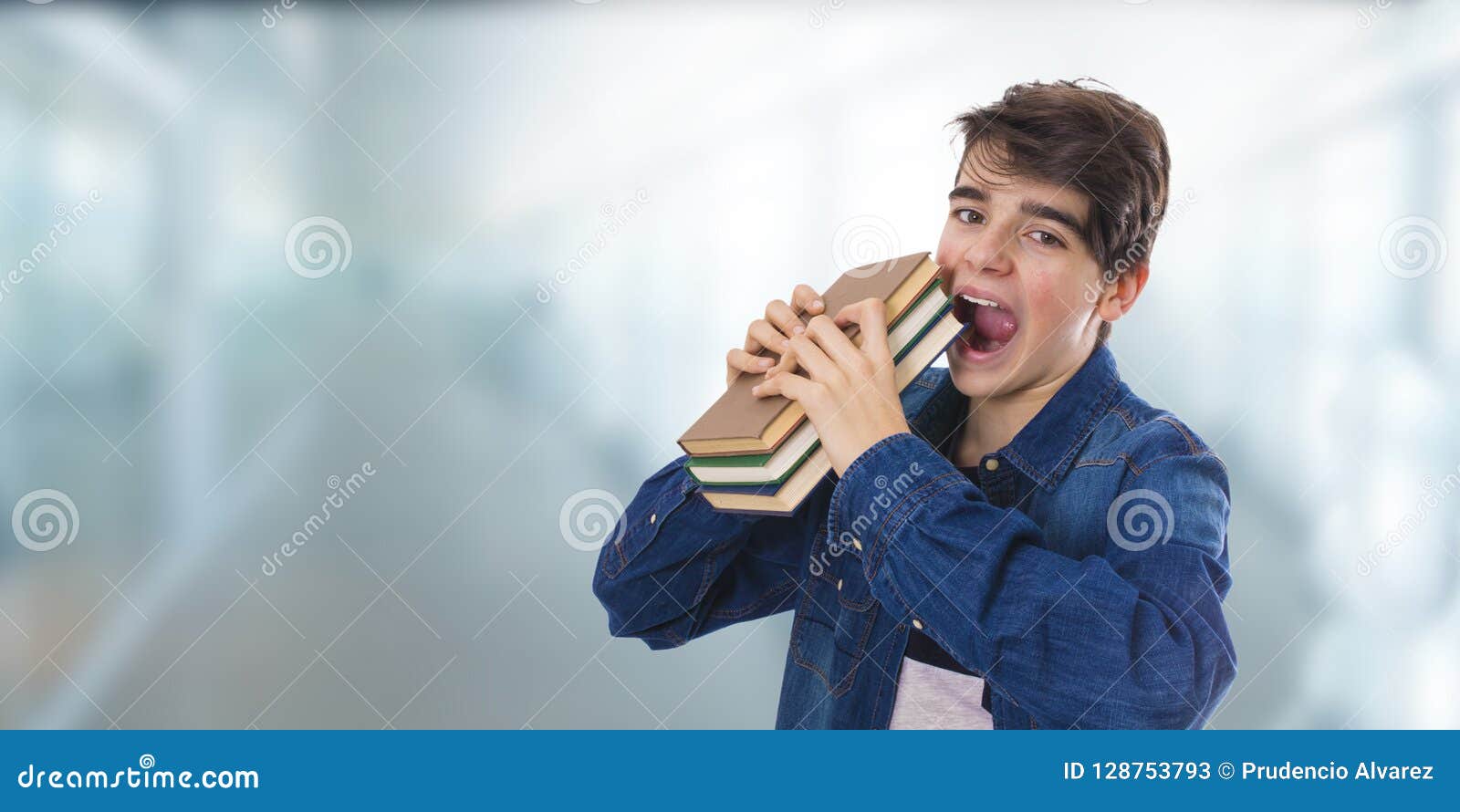 Boy devouring books stock image. Image of reader, concept - 128753793
