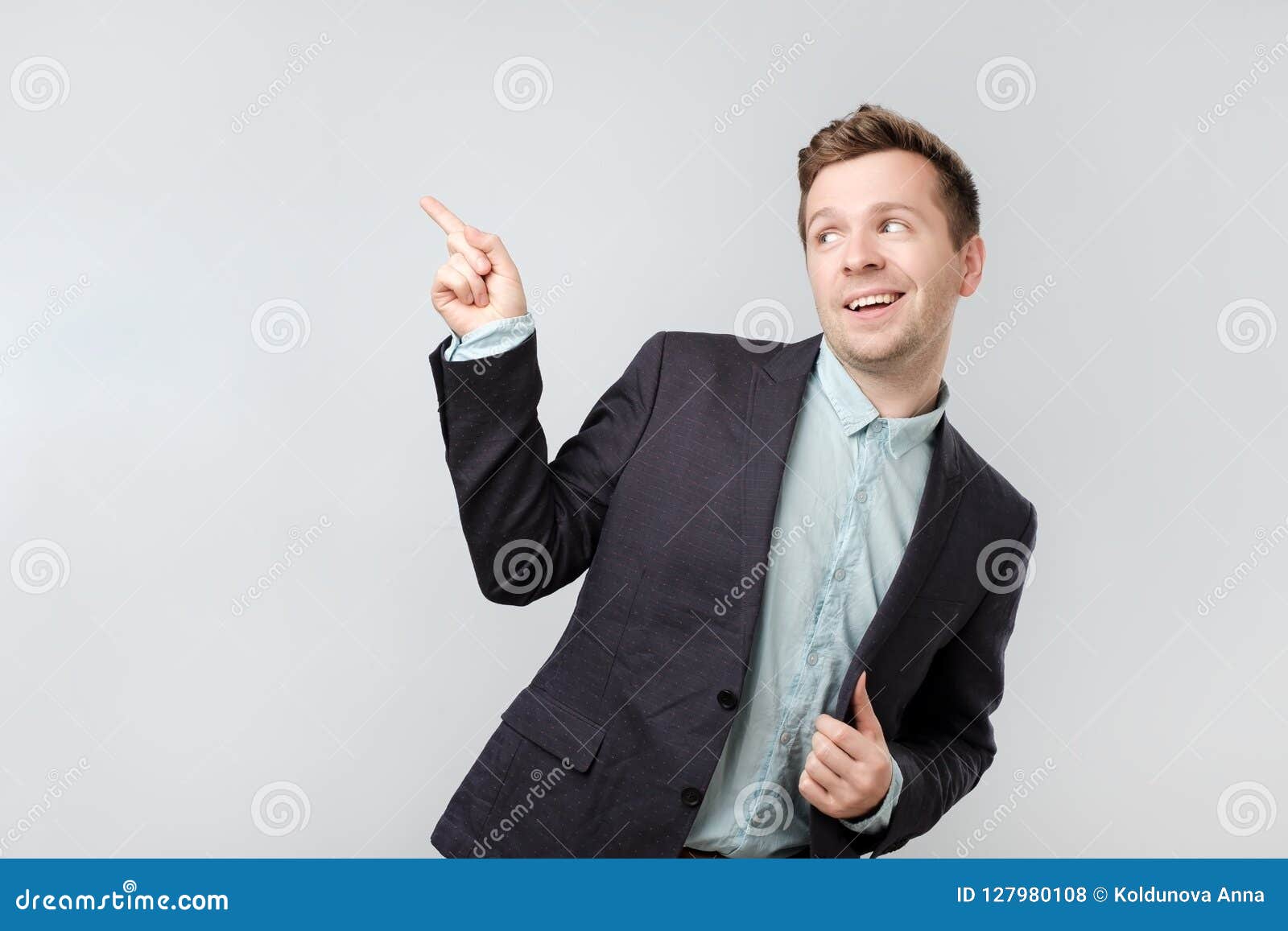 Portrait of a Young Business Man Pointing on Important Information ... Portrait of a Young Business Man Pointing on Important Information ...