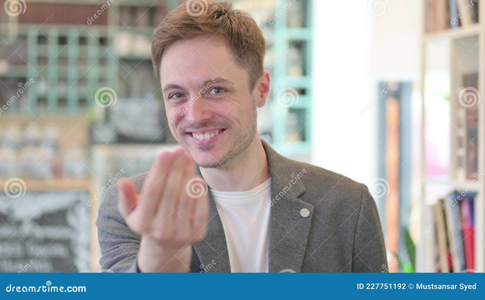 Portrait of Young Man Inviting People for Work Stock Photo - Image of ...