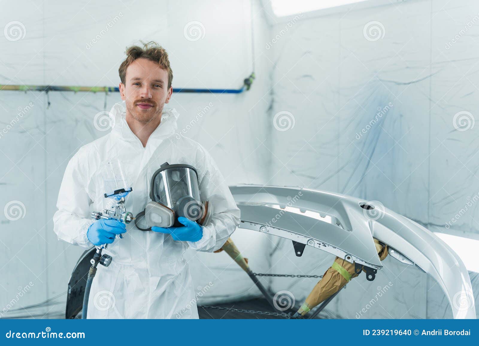 Portrait of a Young Car Painter in a Auto Painting Booth. Stock Photo ...