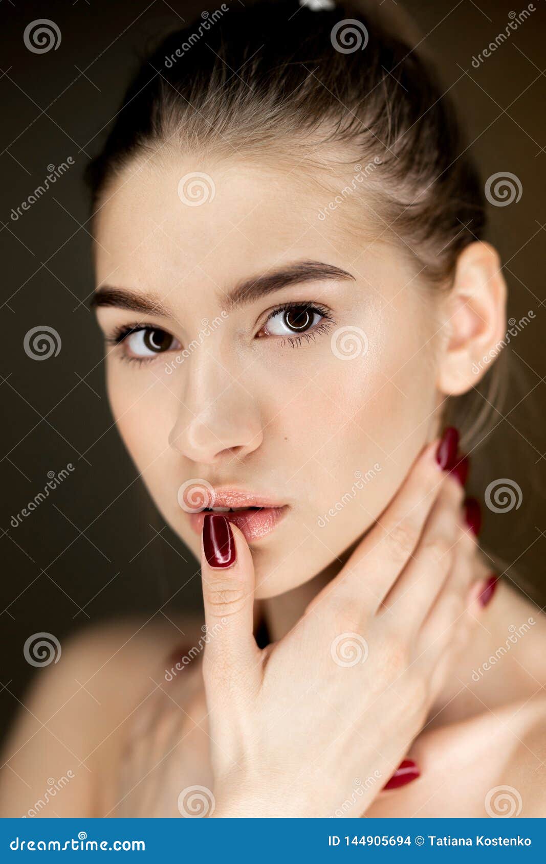 Portrait of Young Charming Girl with Natural Makeup Holding Her Hands ... Portrait of Young Charming Girl with Natural Makeup Holding Her Hands ...