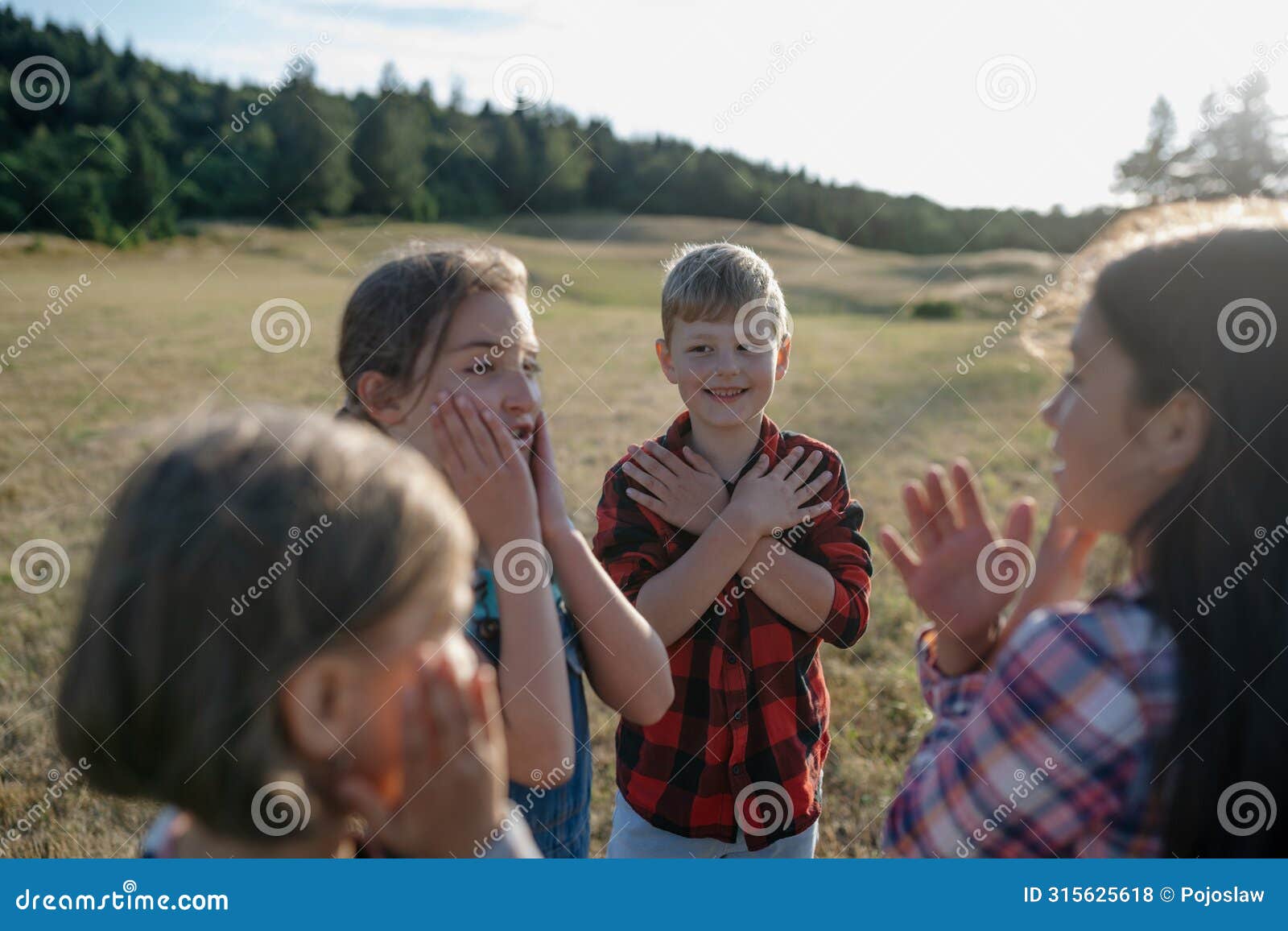 Portrait of Young Classmate Playing Hand Clapping Game Outdoors ...