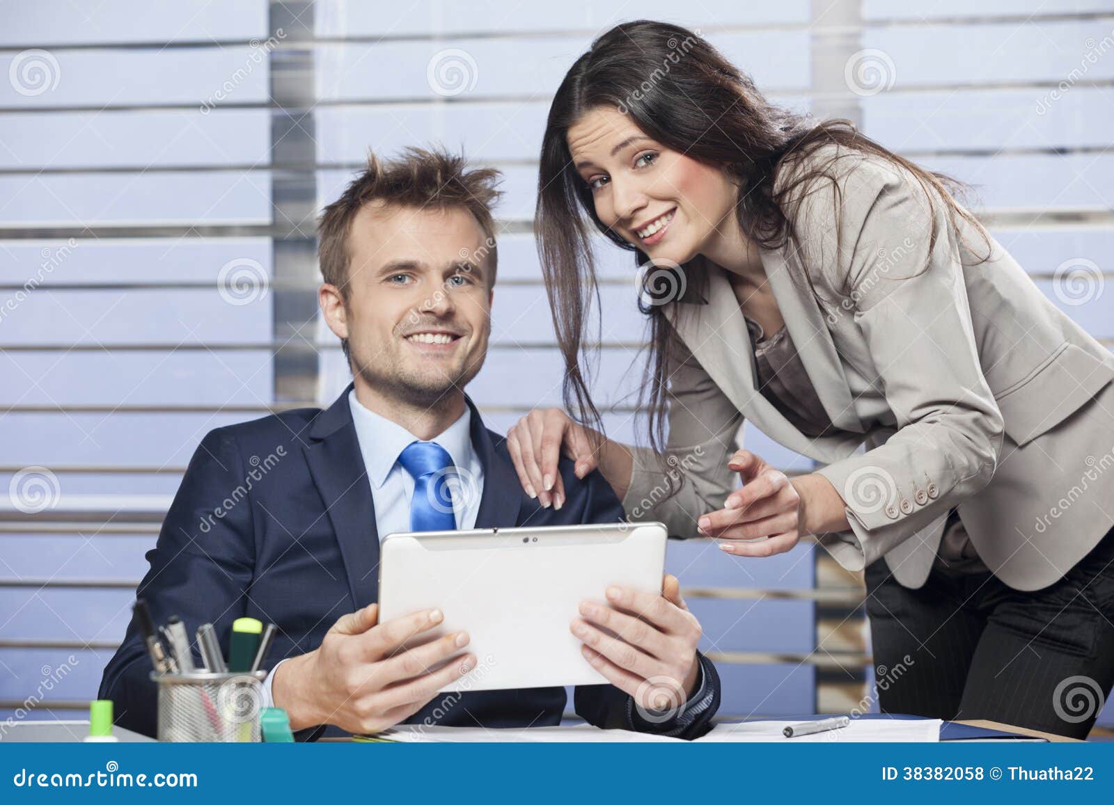 Portrait of a Young Colleagues Working Together Stock Photo - Image of ...