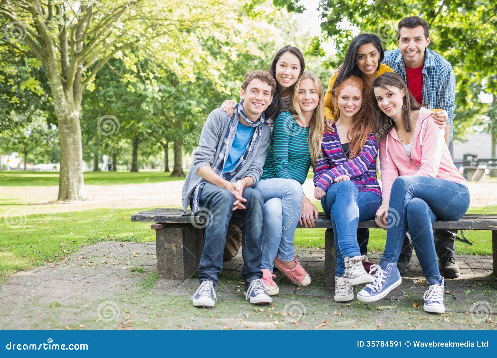 Portrait of Young College Students in Park Stock Image - Image of ...