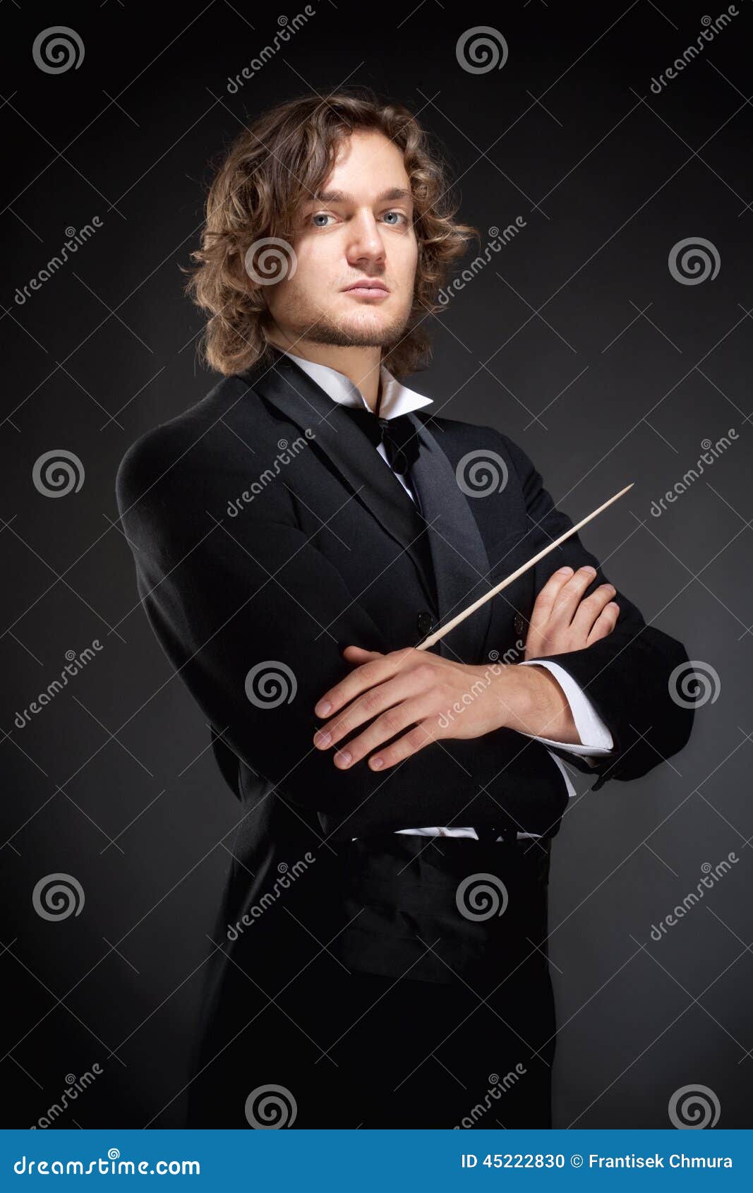 Portrait of a Young Conductor. Stock Photo - Image of holding, looking ...