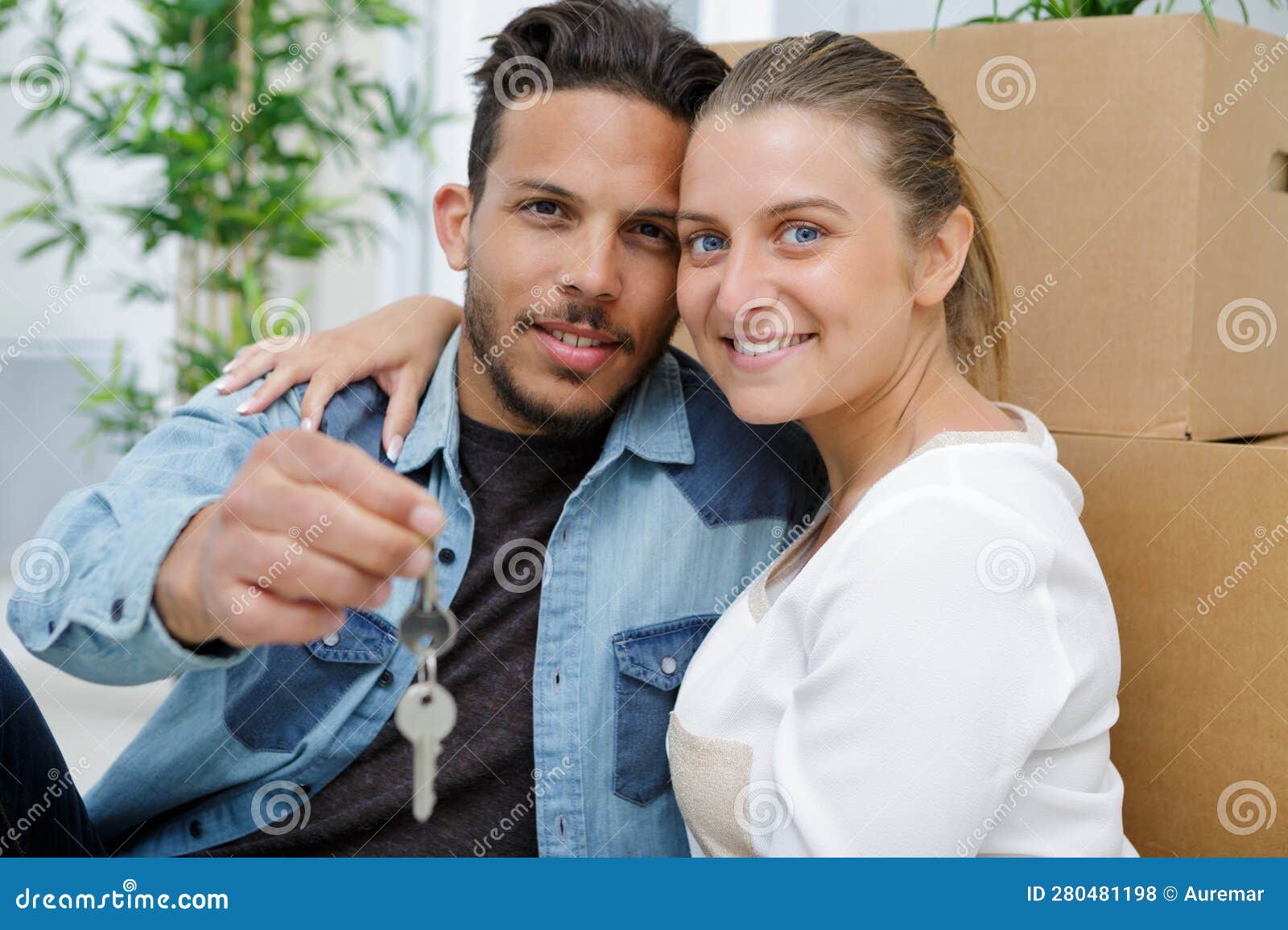 Portrait Young Couple Holding Keys by Stacked Boxes Stock Photo - Image ...