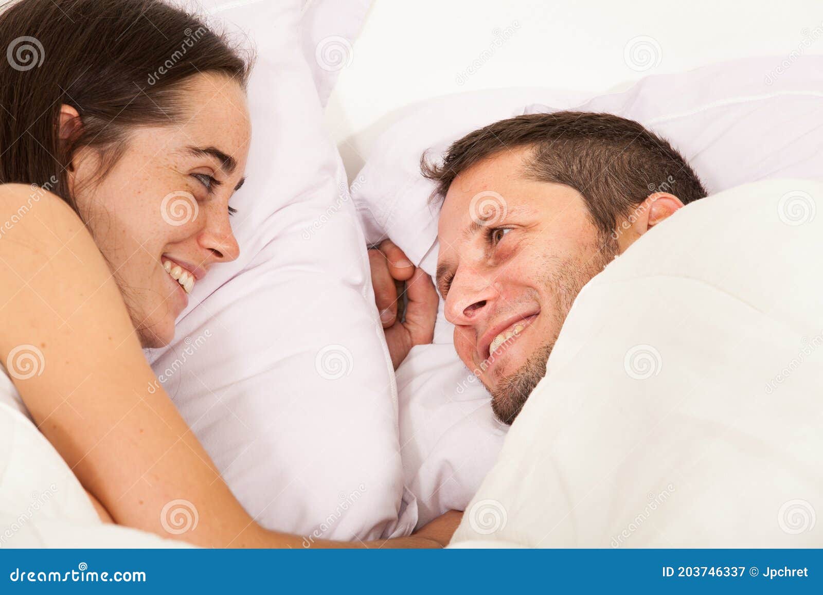 Portrait of a Young Couple in Love in a Bed Stock Image - Image of ...