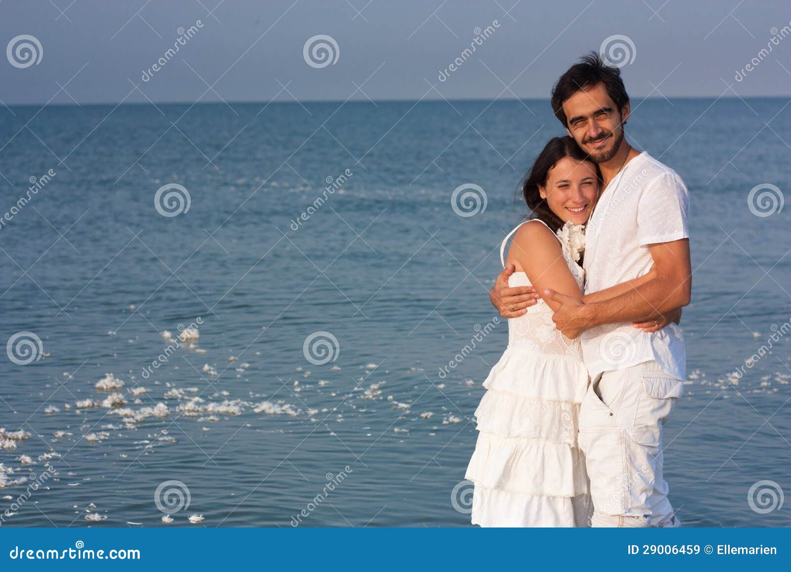 Portrait of Young Couple in White Clothes in the Sea Stock Image ...